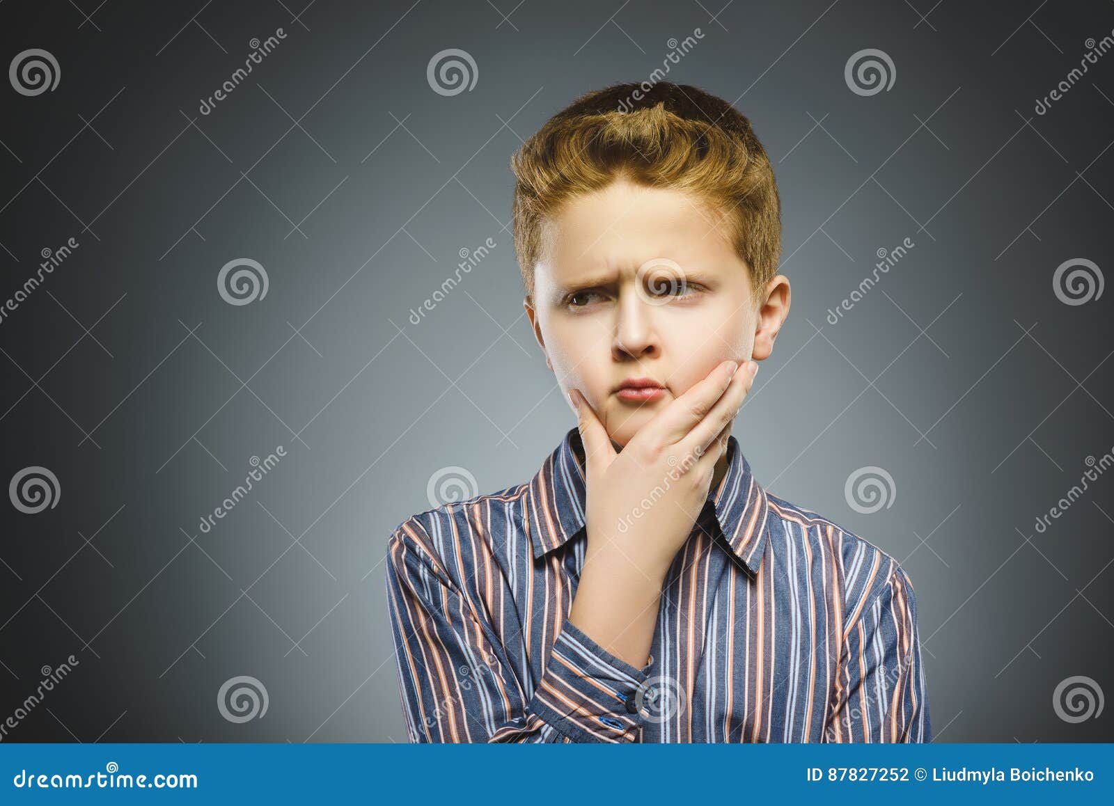 Doubt, Expression and People Concept - Boy Thinking Over Gray ...