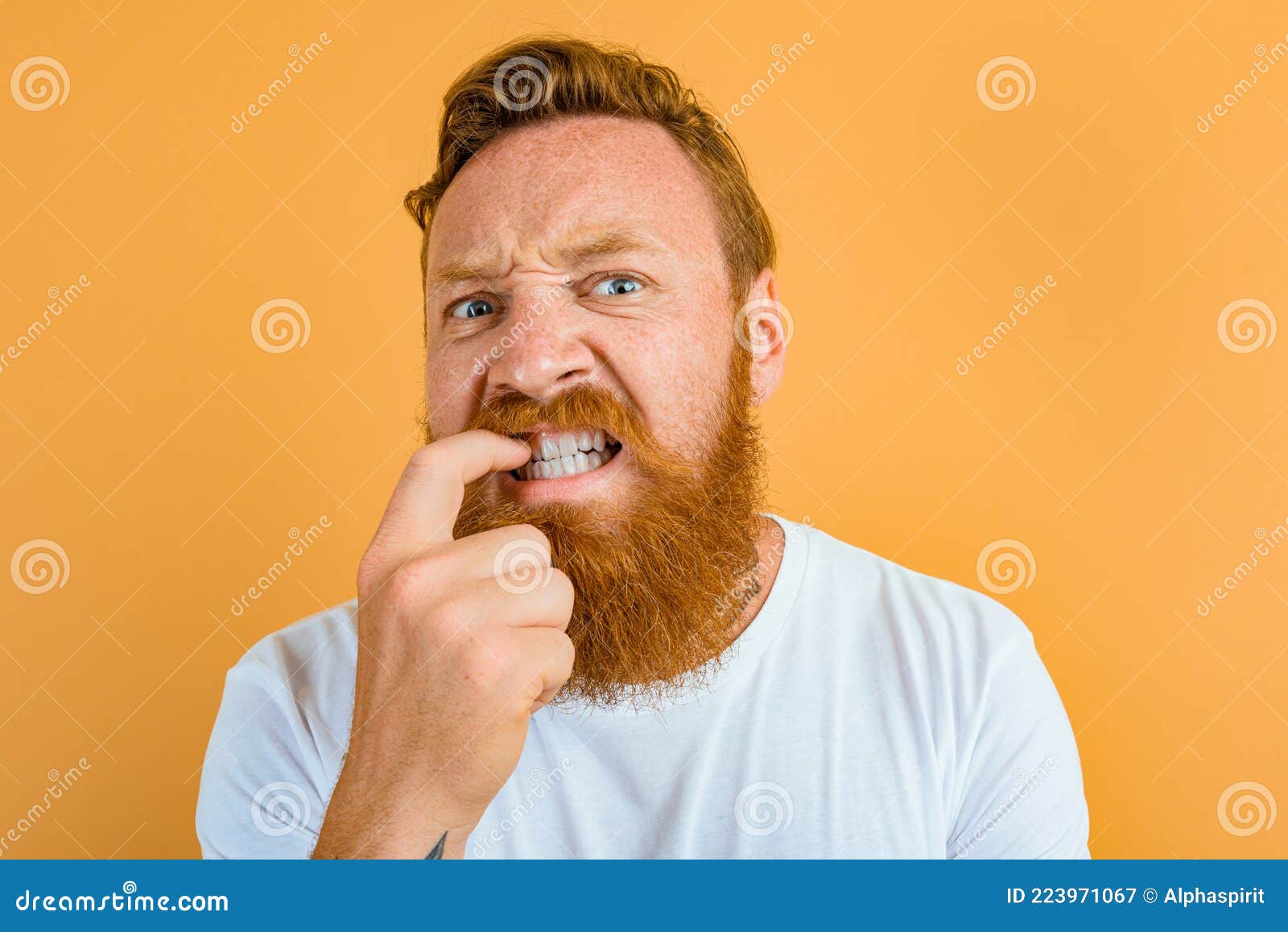Doubter Man with Beard, Tattoo and White T-shirt Stock Image - Image of ...