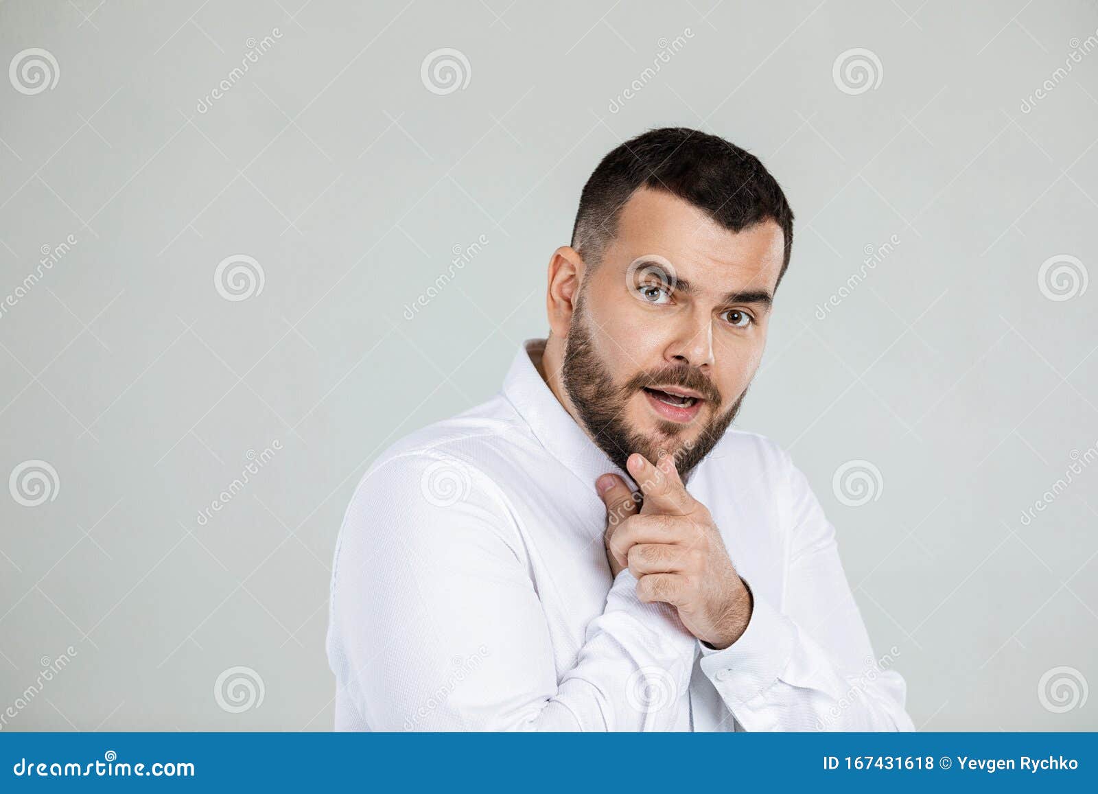Doubtful Bearded Man on Gray Background. Stock Photo - Image of ...