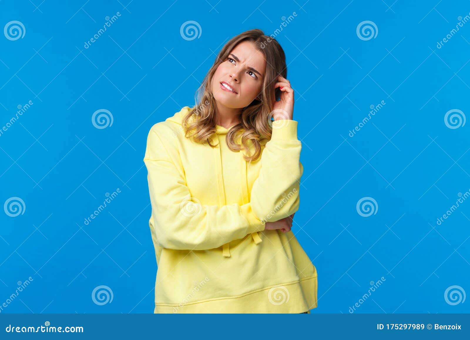 Doubtful and Indecisive Young Focused Blond Female Student Trying Solve ...