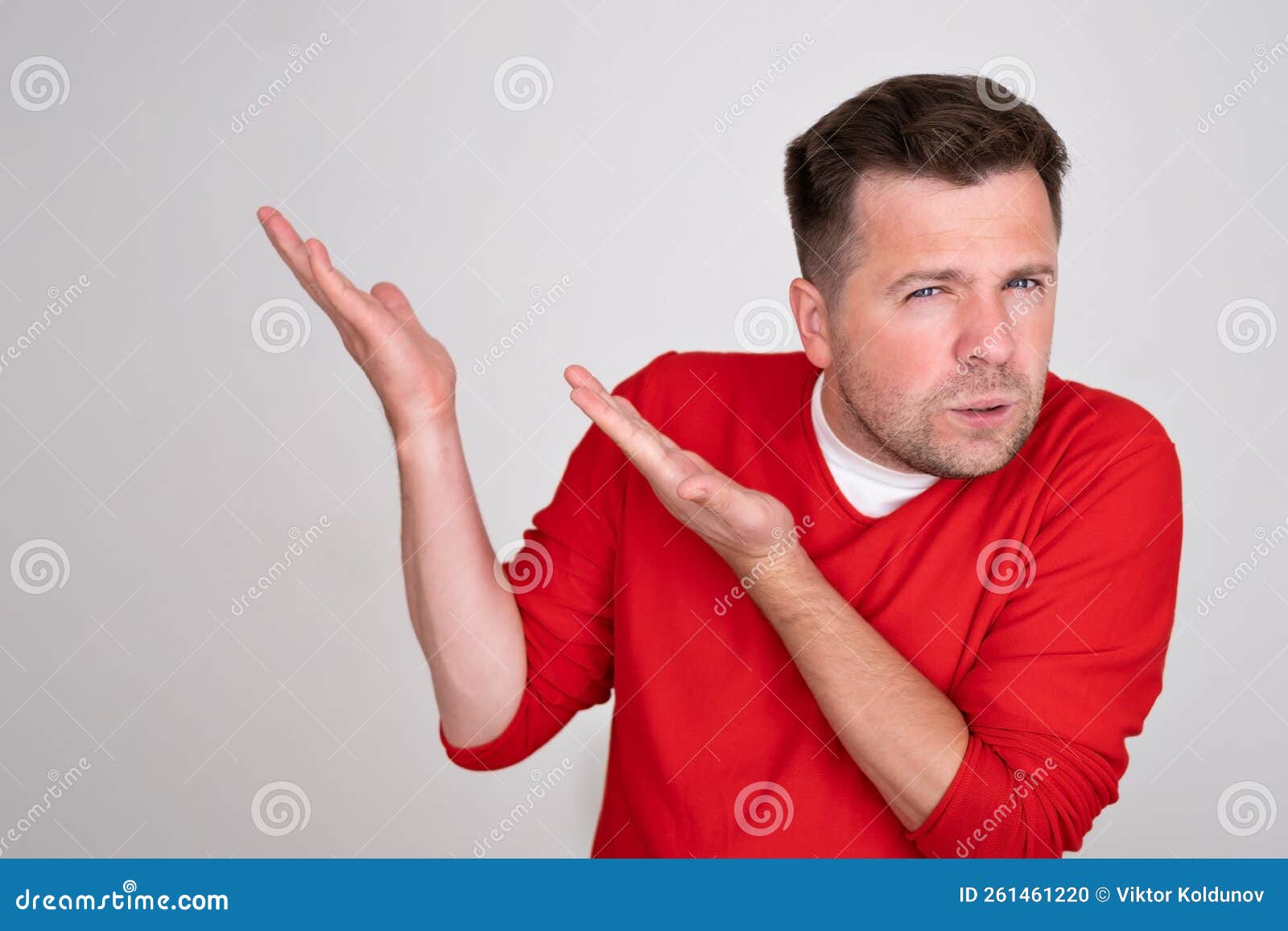 Doubtful Man Points at Corner, Feels Hesitant about Something Stock ...