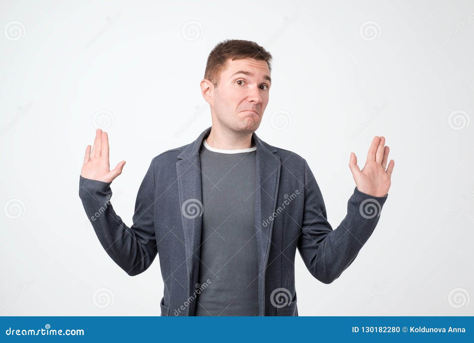 Doubtful Man with Thoughtful Expression Making Choice in Studio ...