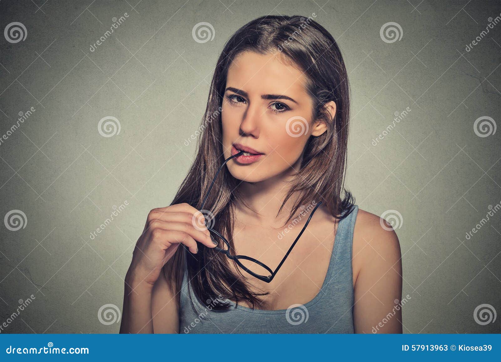 Doubtful young woman stock image. Image of confused, critical - 57913963