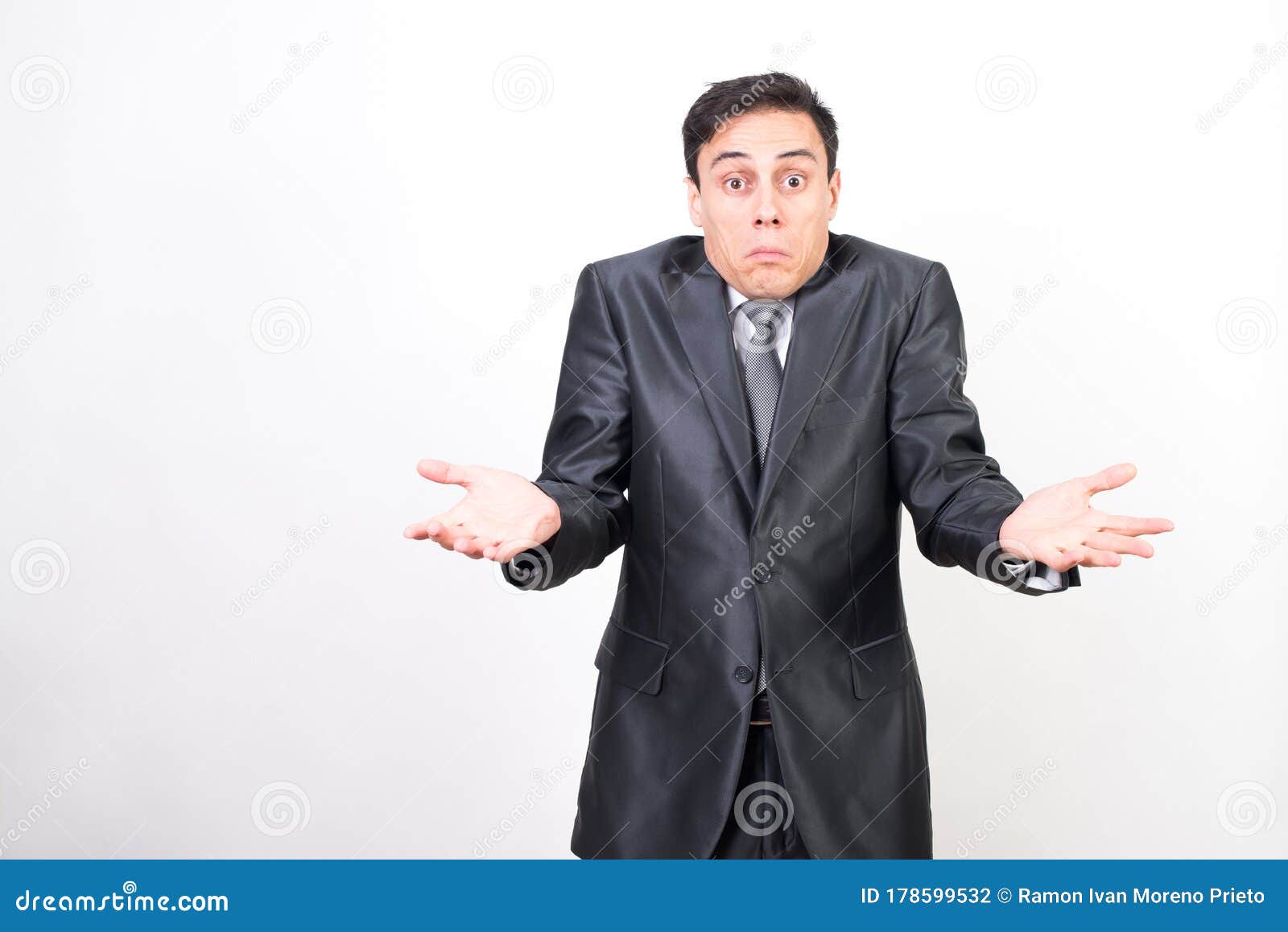 Doubting man in suit stock photo. Image of unsure, isolated - 178599532