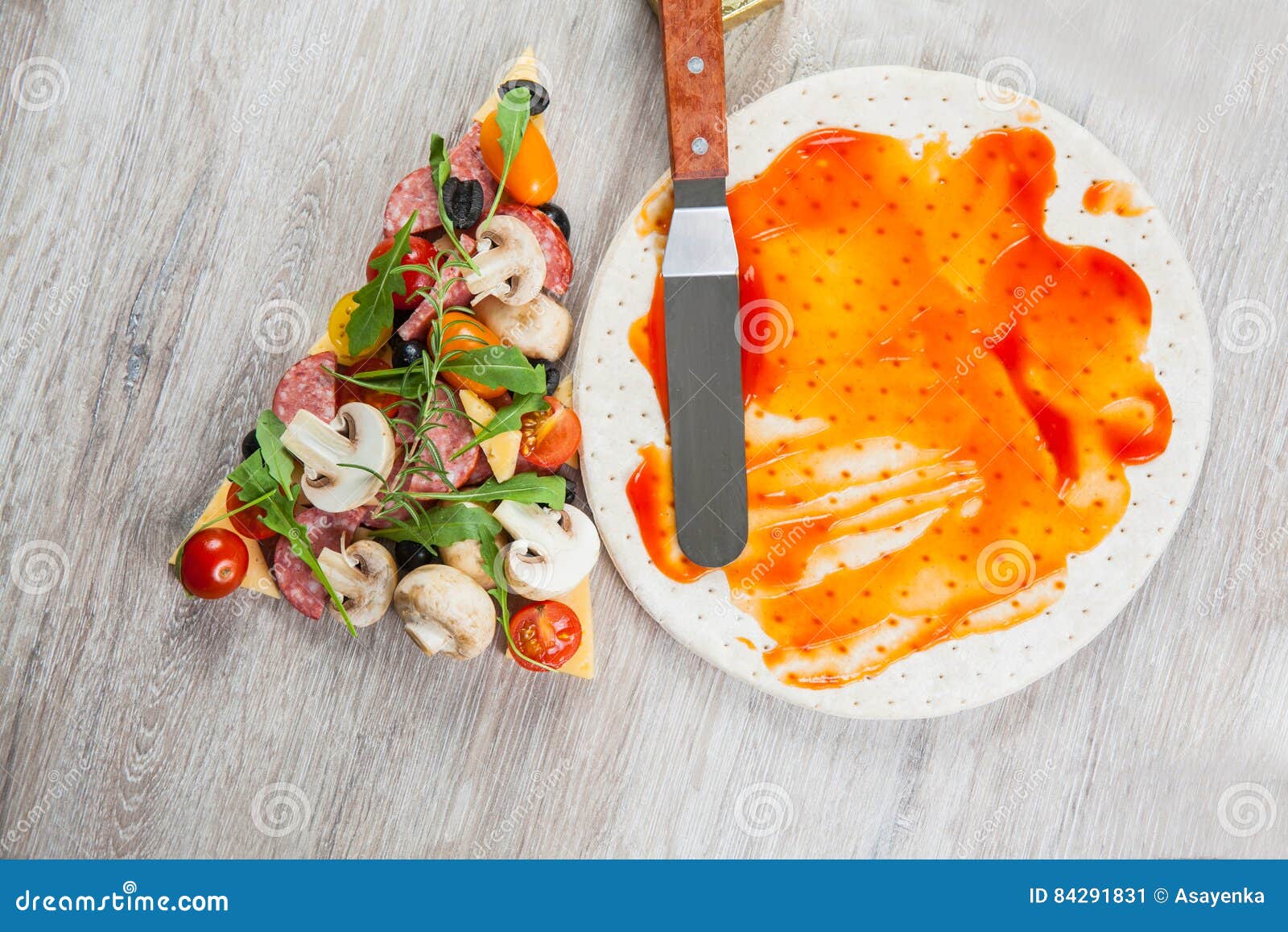 Dough Basis Covered with Ketchup and Ingredients for Pizza. on a Wooden ...