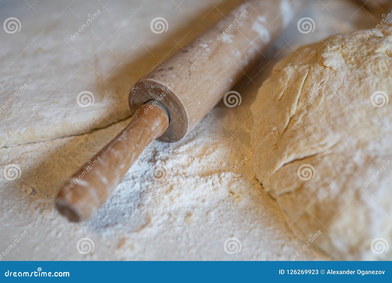 Dough and a rolling pin stock image. Image of concept - 126269923