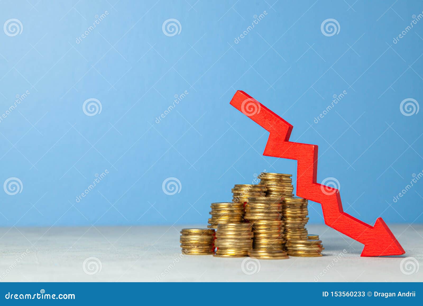 Down Arrow and Stack of Coins. the Concept of Tax Cuts or Falling ...