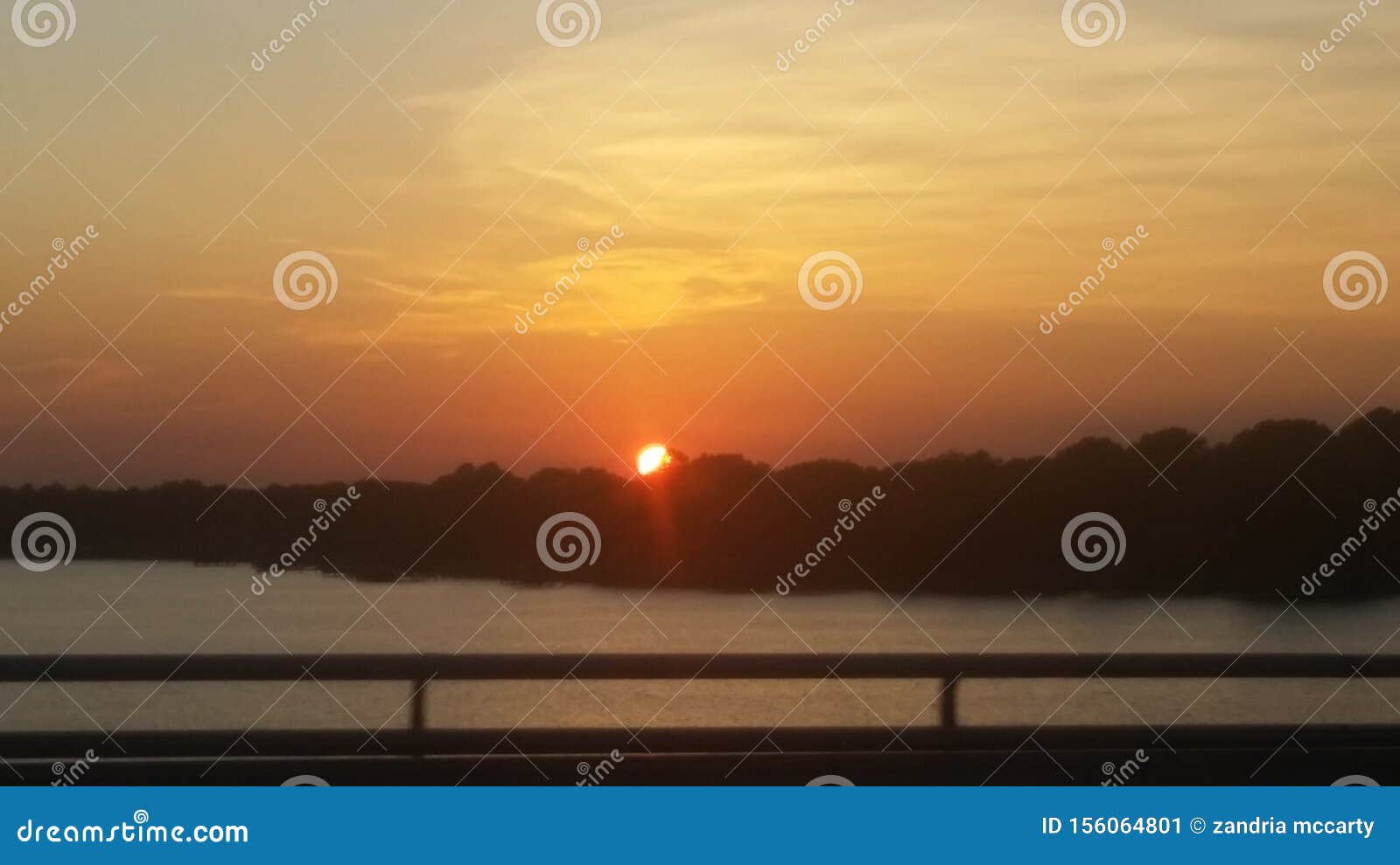 Down at the Lake Sunset Bridge Stock Image - Image of sunset, bridge ...