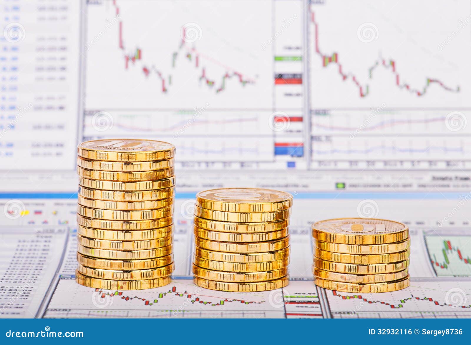 Down Trend Stacks of Golden Coins and Financial Chart As the Background ...