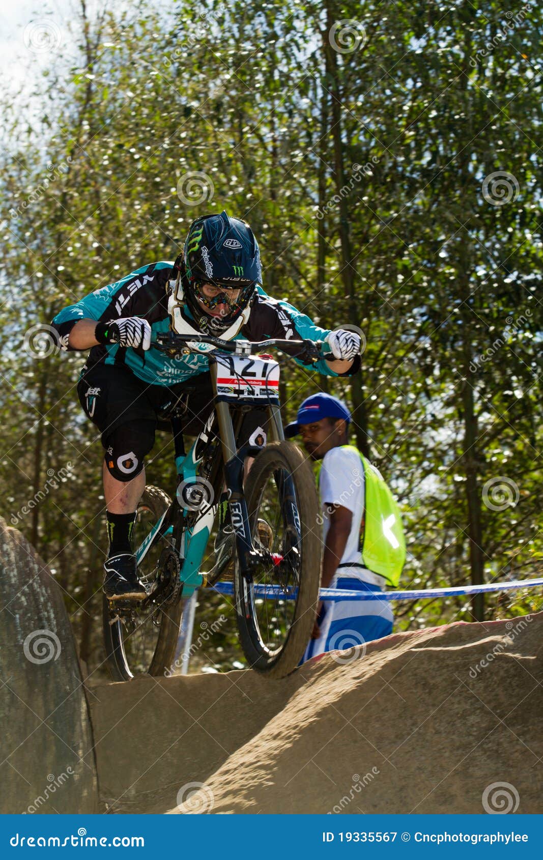 Downhill Rider Focused Over Rock Obstacle Editorial Photography - Image ...