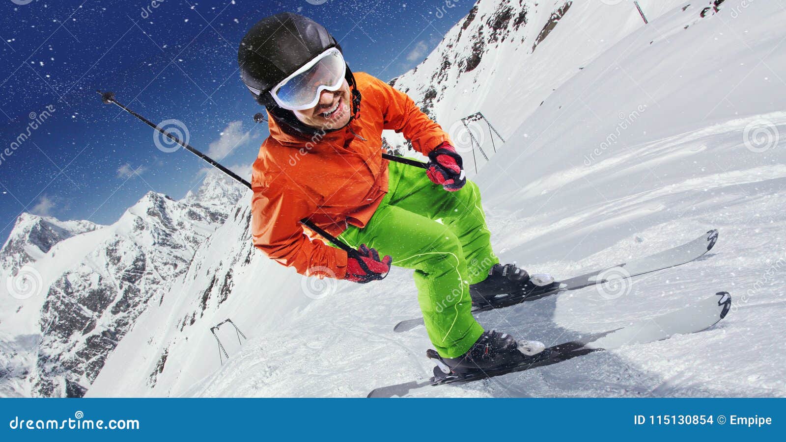 Downhill skier on slope stock photo. Image of seasonal - 115130854