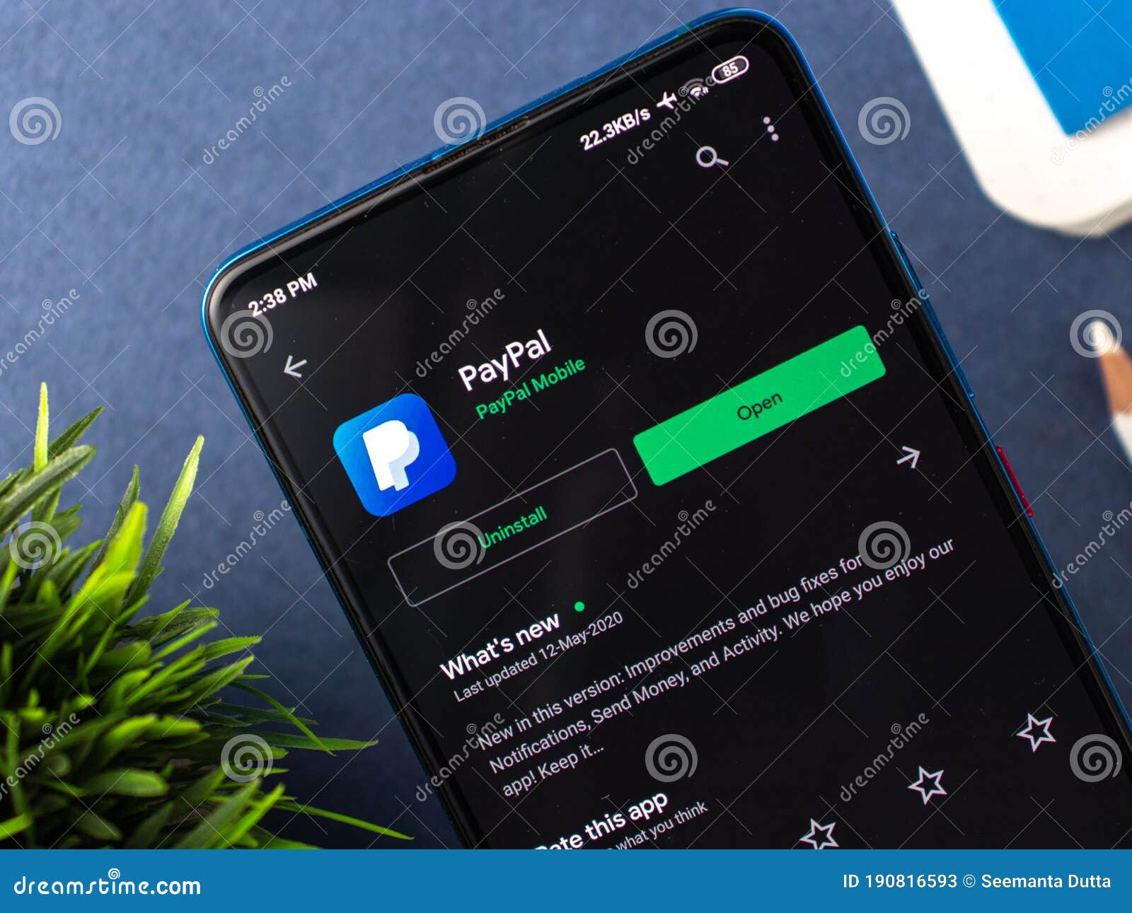 Downloading Paypal Mobile App from Google Play Store Photographed on ... Downloading Paypal Mobile App from Google Play Store Photographed on ...