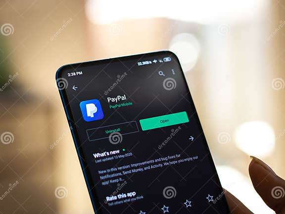 Downloading Paypal Mobile App from Google Play Store Photographed on ... Downloading Paypal Mobile App from Google Play Store Photographed on ...