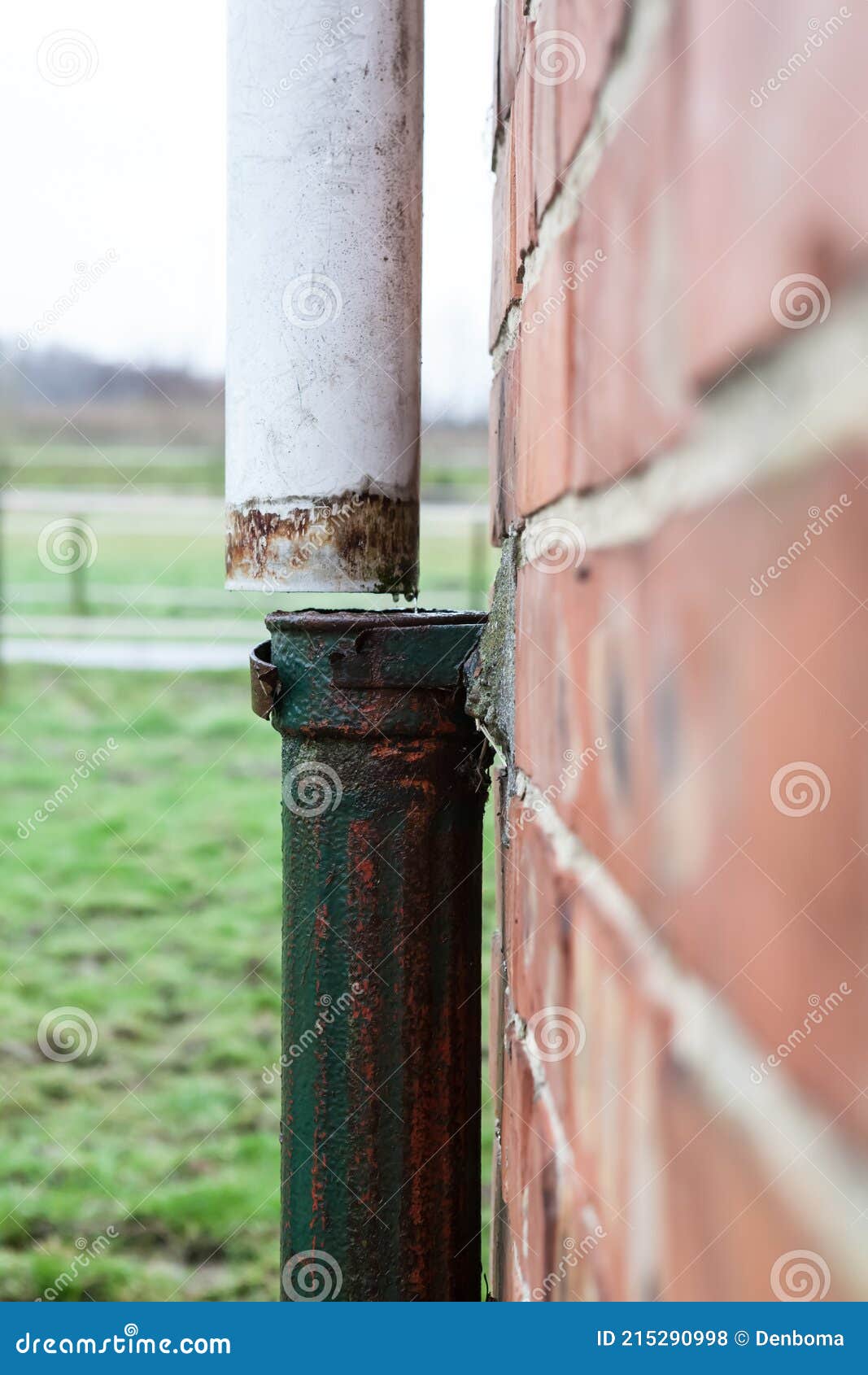 Downspout is broken stock photo. Image of downpipe, close - 215290998
