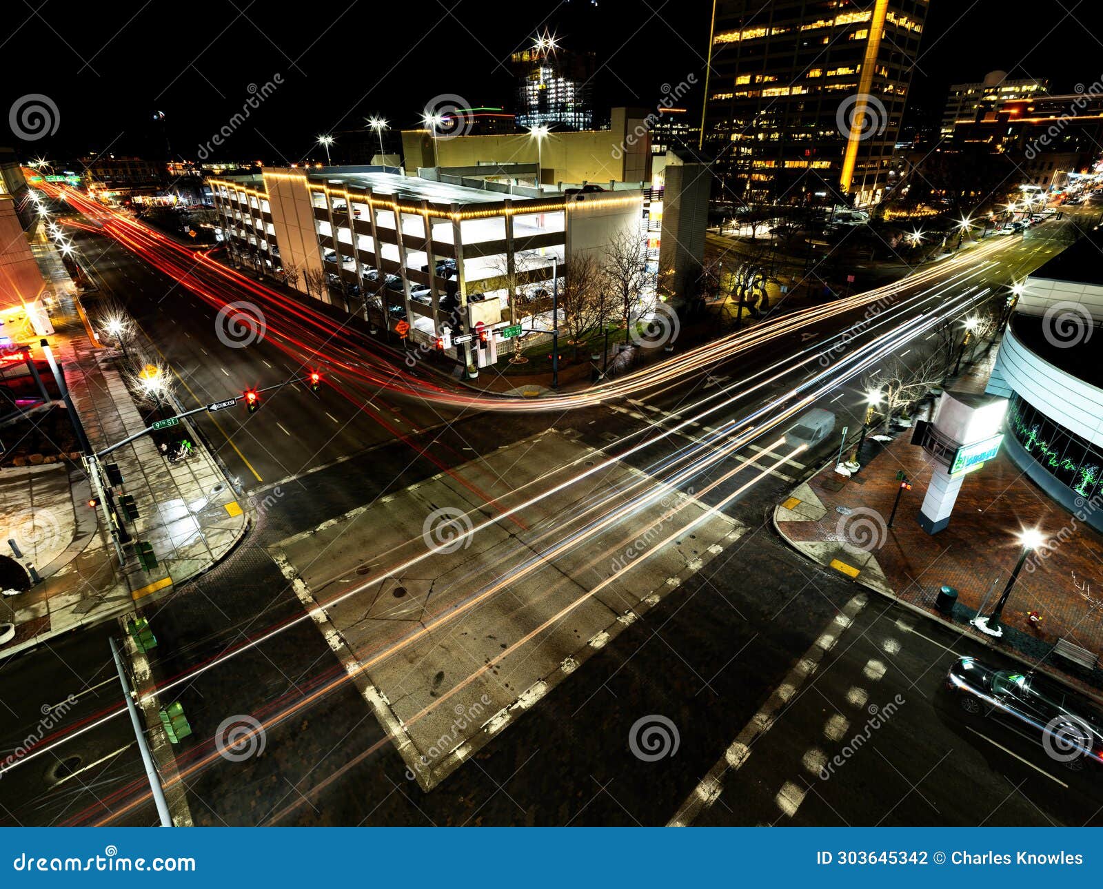 Downtown Busy Intersection at Night with Streaking Car Lights Stock ...