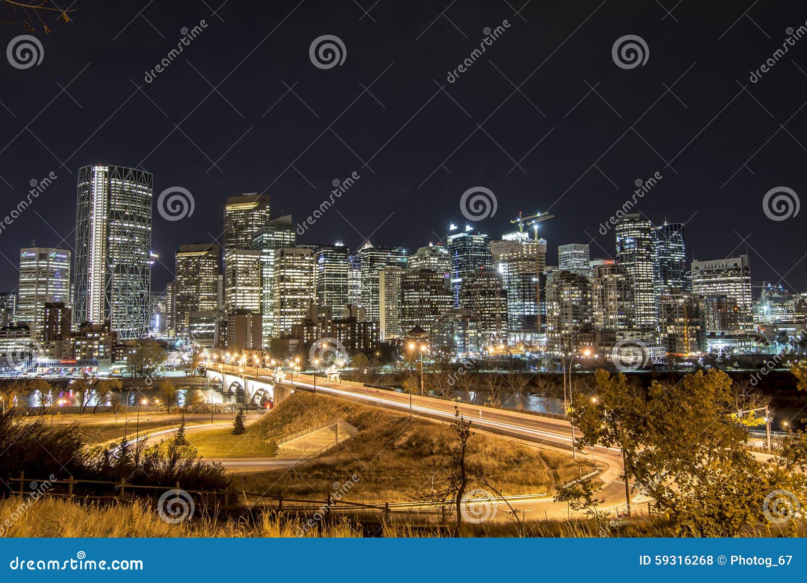 Downtown Calgary at Night editorial stock photo. Image of streaks ...