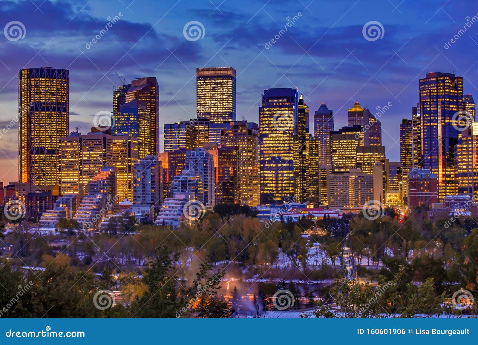 Downtown Calgary Skyline Lit Up at Night Stock Photo - Image of cloudy ...
