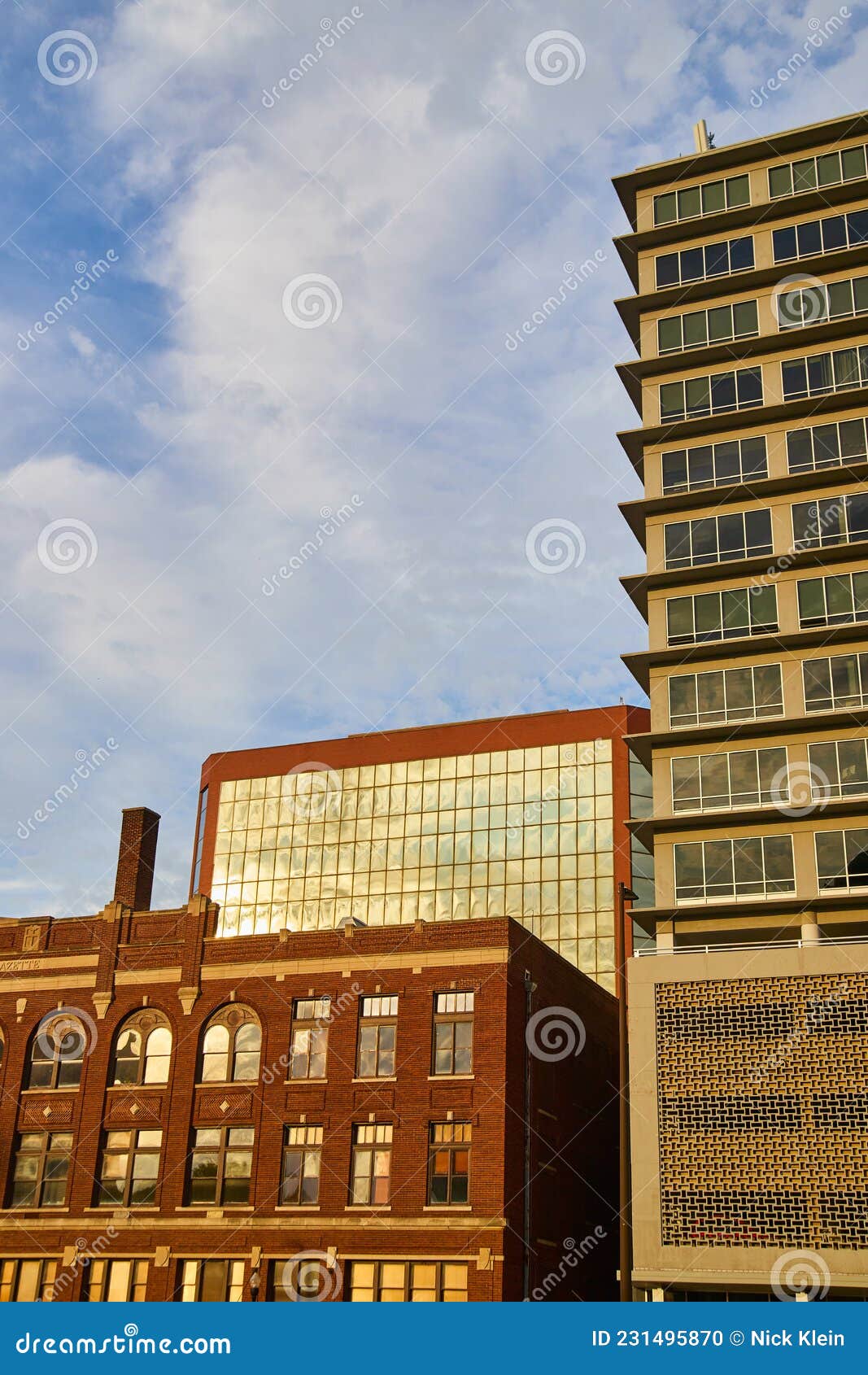 Downtown City Buildings with Sunlight Hitting Windows Stock Photo ...