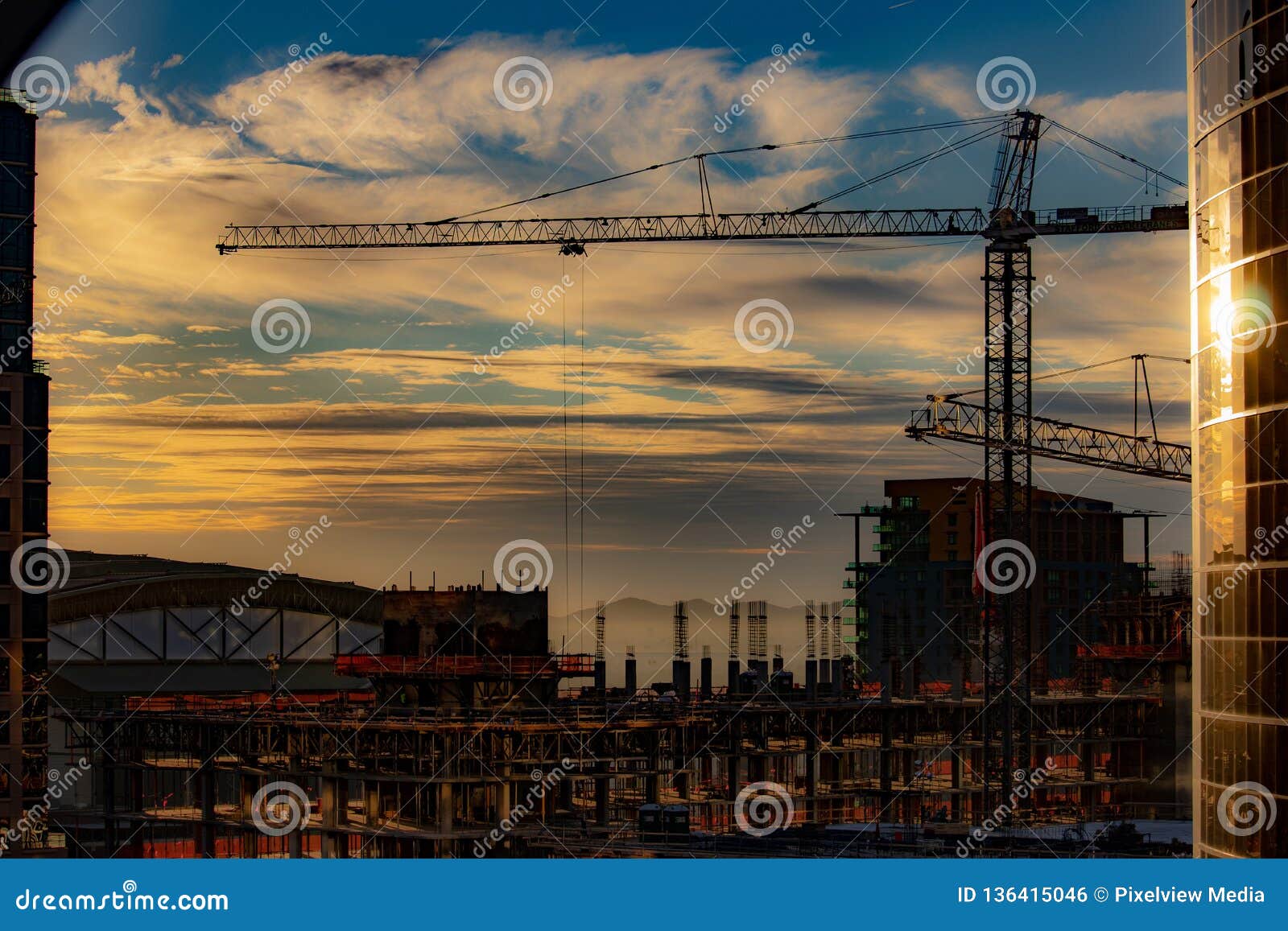 Downtown Sunset Over Construction Site with Crane Editorial Photo ...