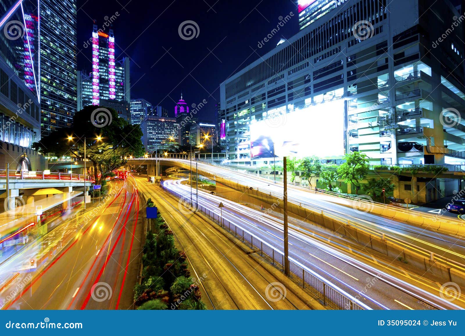 Downtown Traffic at Night in Modern City Stock Photo - Image of ...