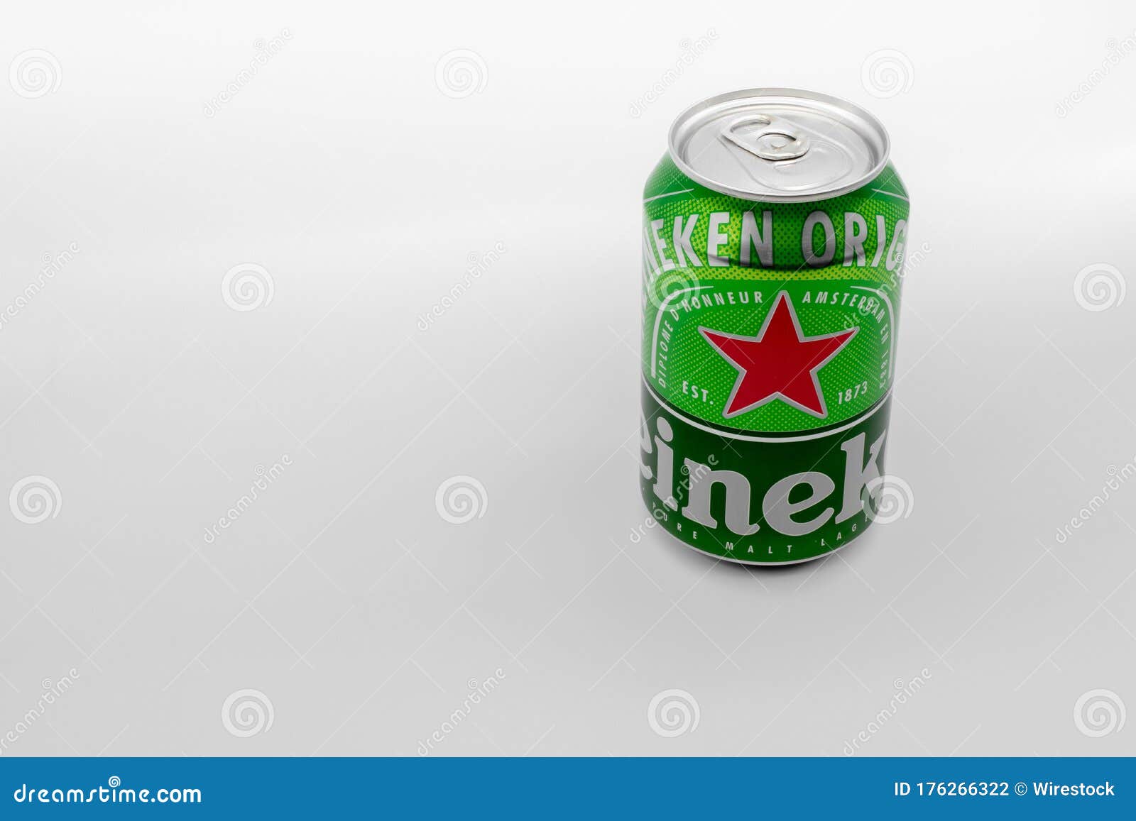 A Downview Shot of a Green Can of Heineken Beer on a White Surface with ...