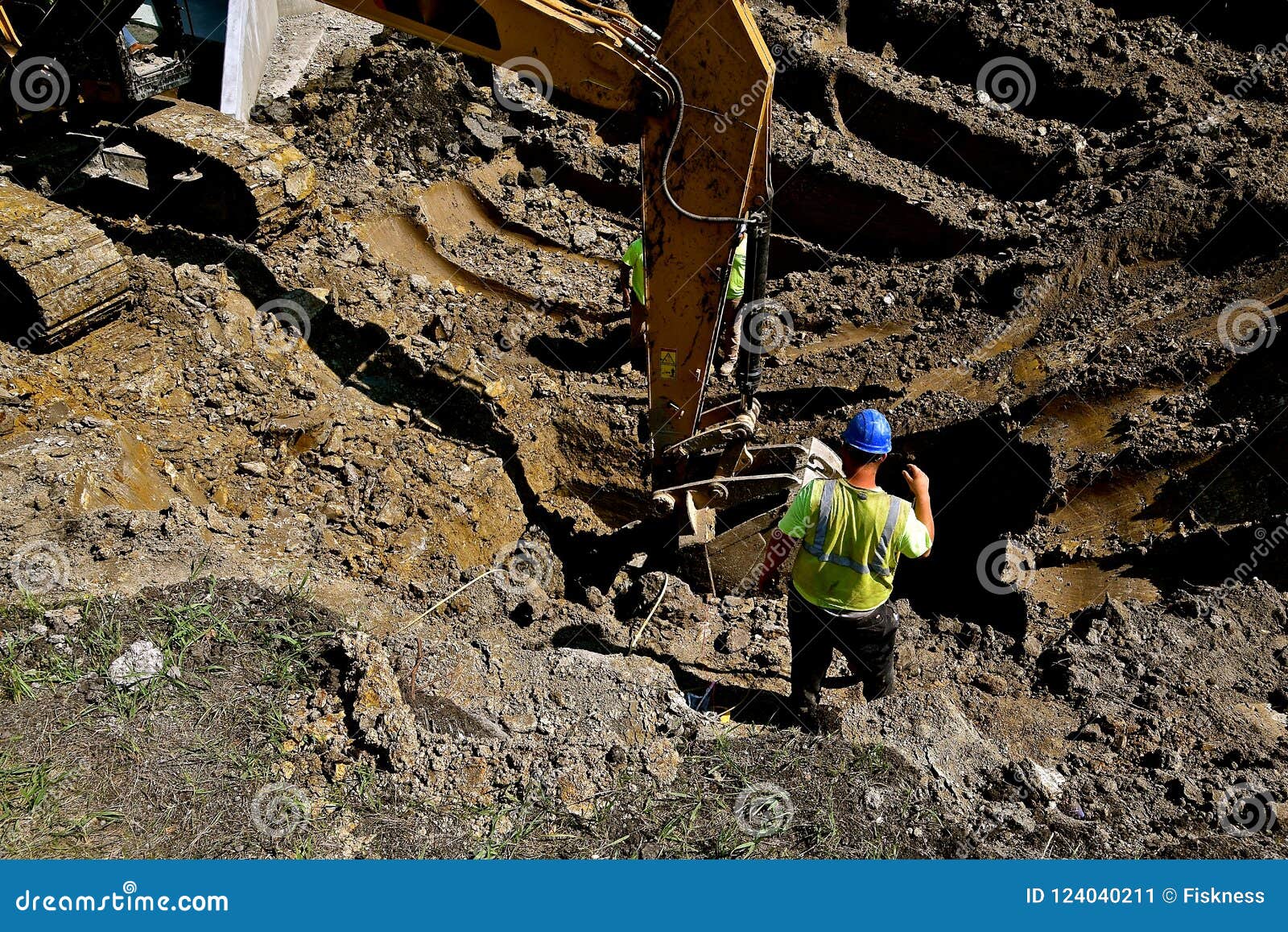 Downward Look at Excavating Machine Digging a Hole Stock Image - Image ...