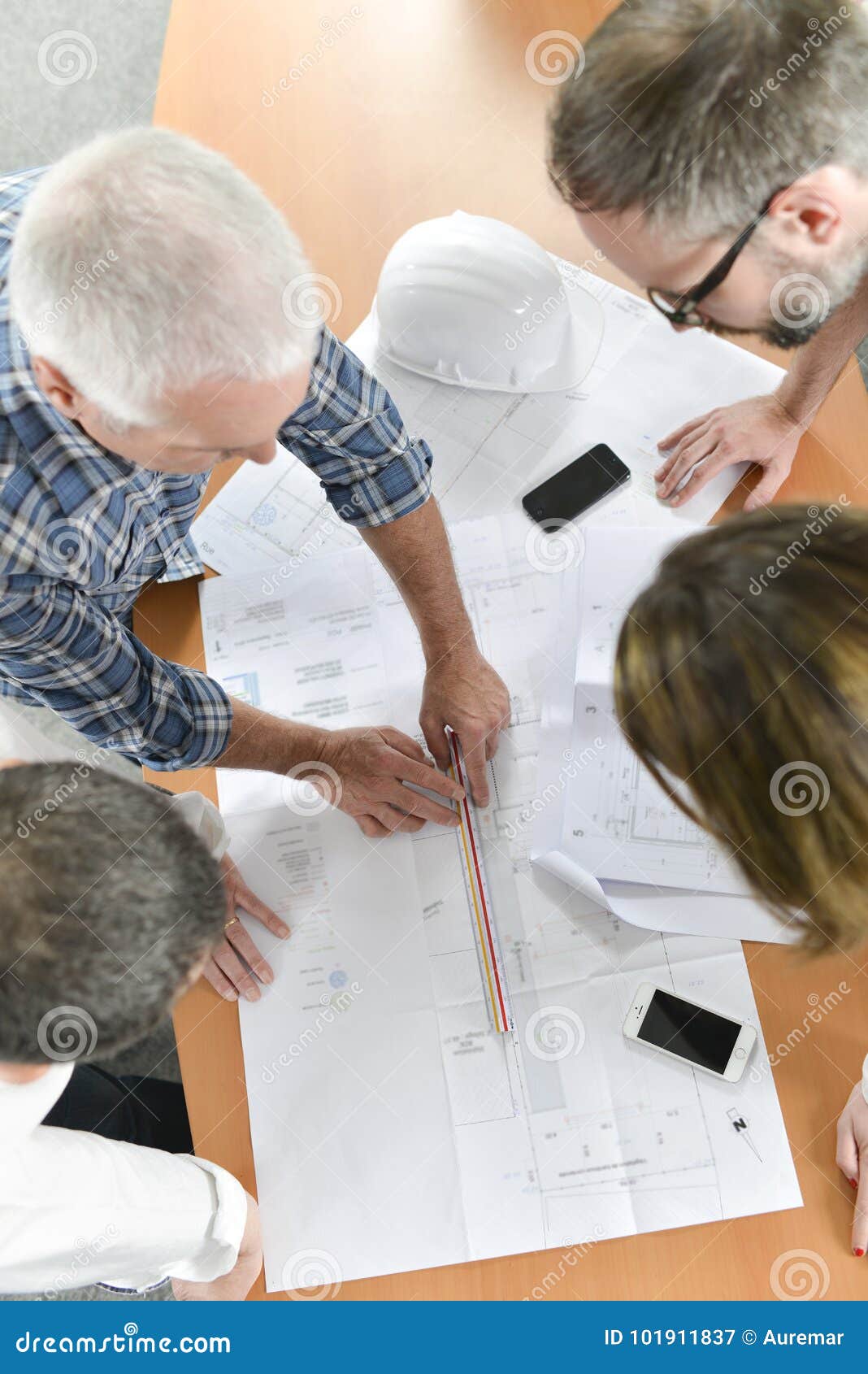 Downward View Men Looking at Blueprints Stock Image - Image of ...