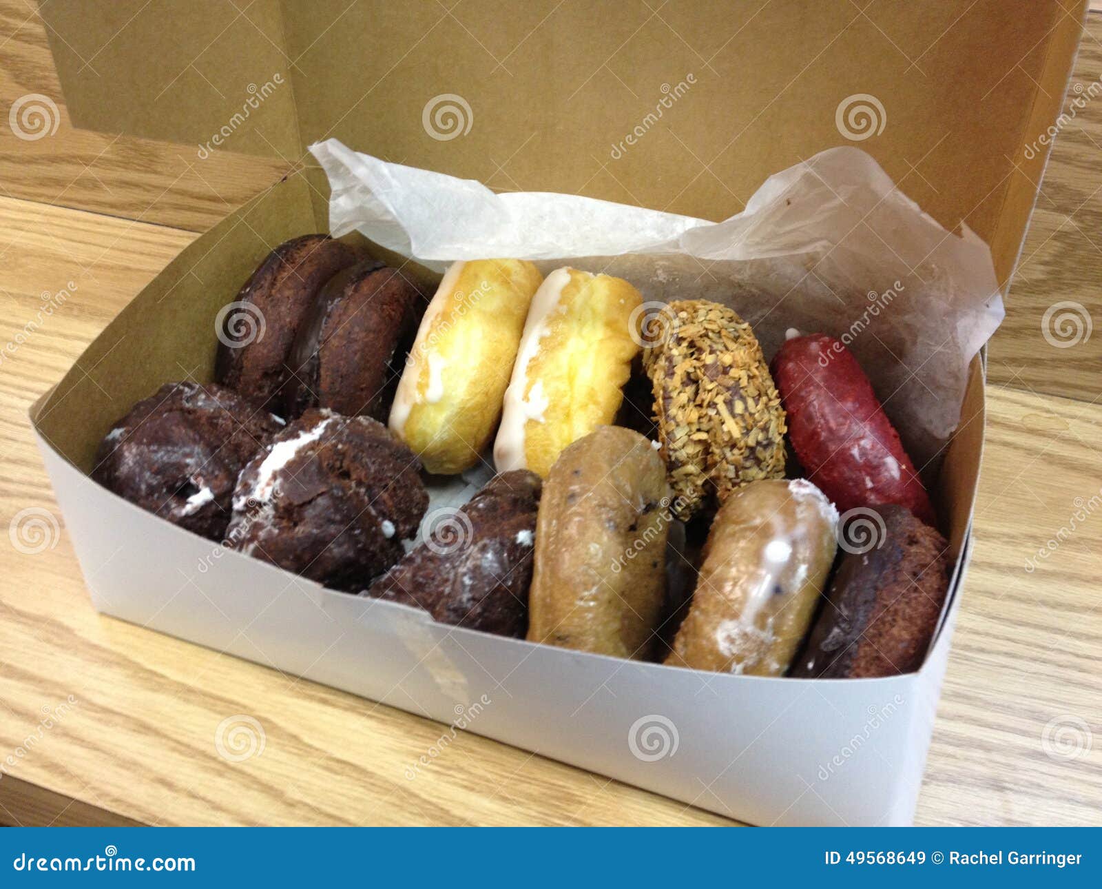 A Dozen Donuts stock image. Image of cream, cake, sweets - 49568649