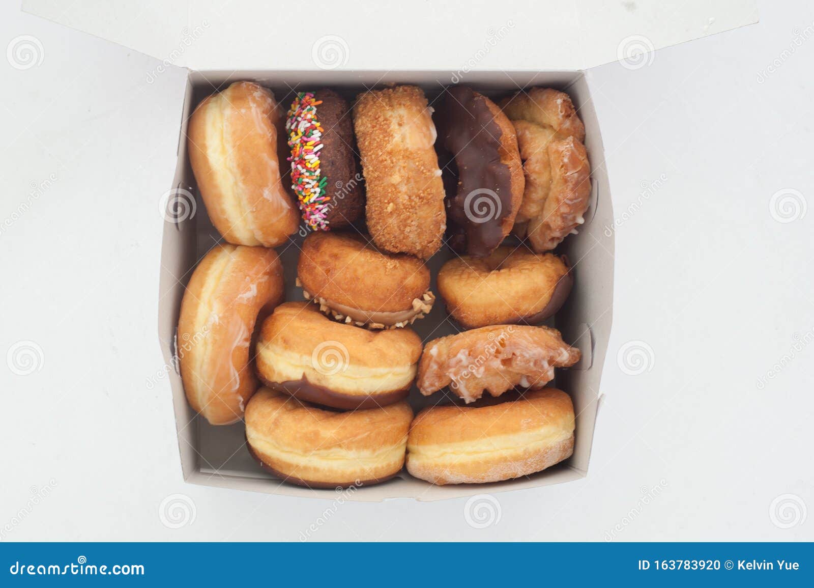 Dozen donuts stock photo. Image of chocolate, backgroundn - 163783920