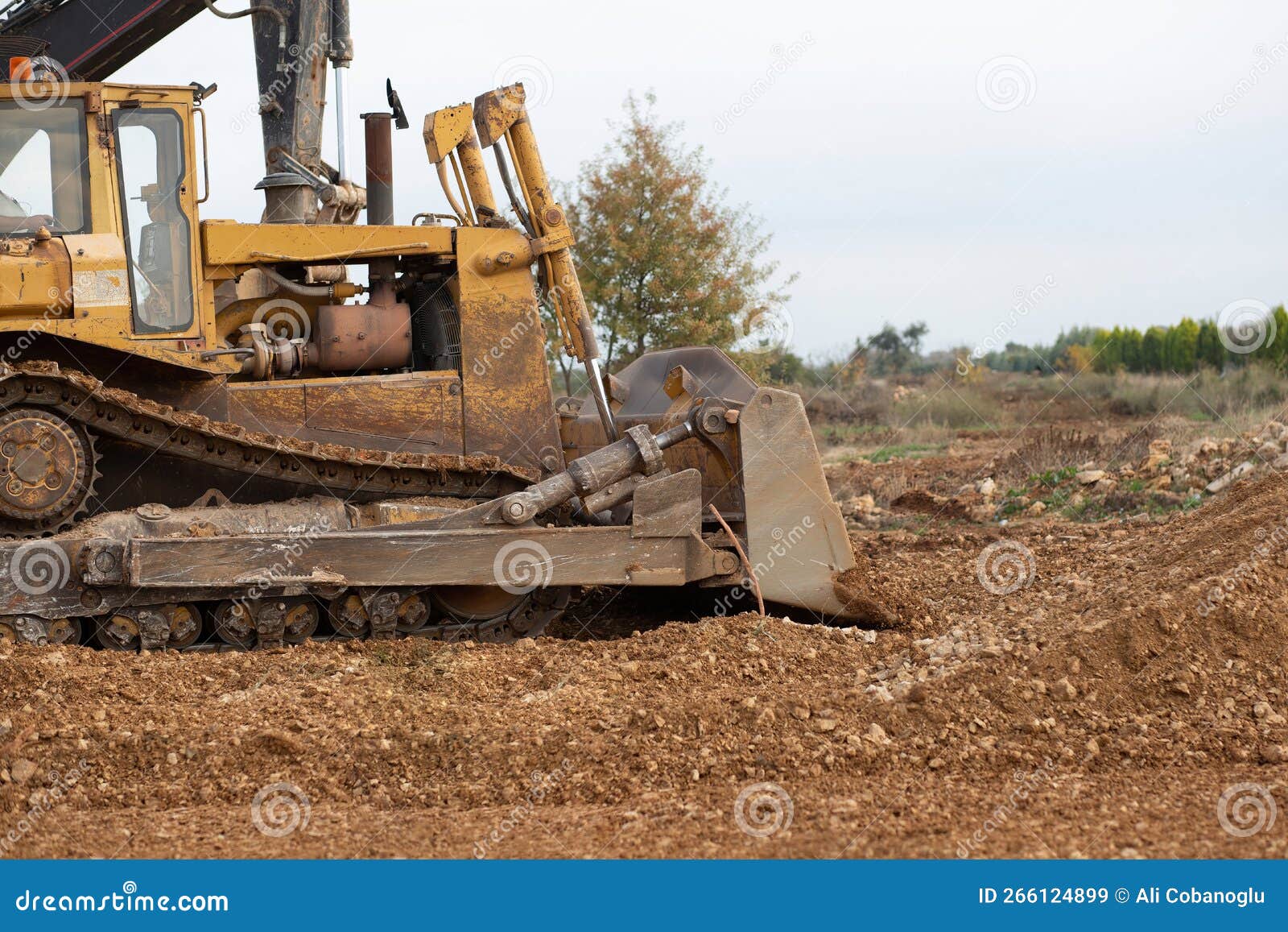 Dozer Working at Construction Site. Bulldozer for Land Clearing ...