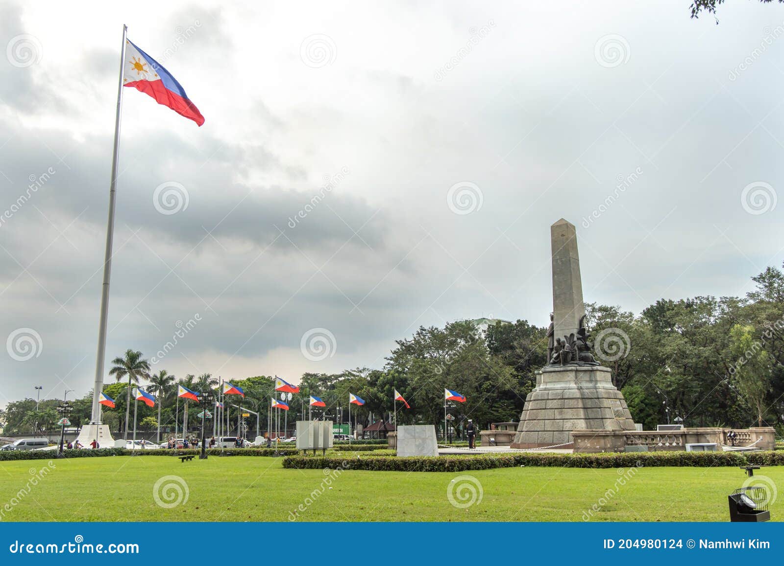 Dr. Jose Rizal National Monument and National Flags in the Wind, Manila ...