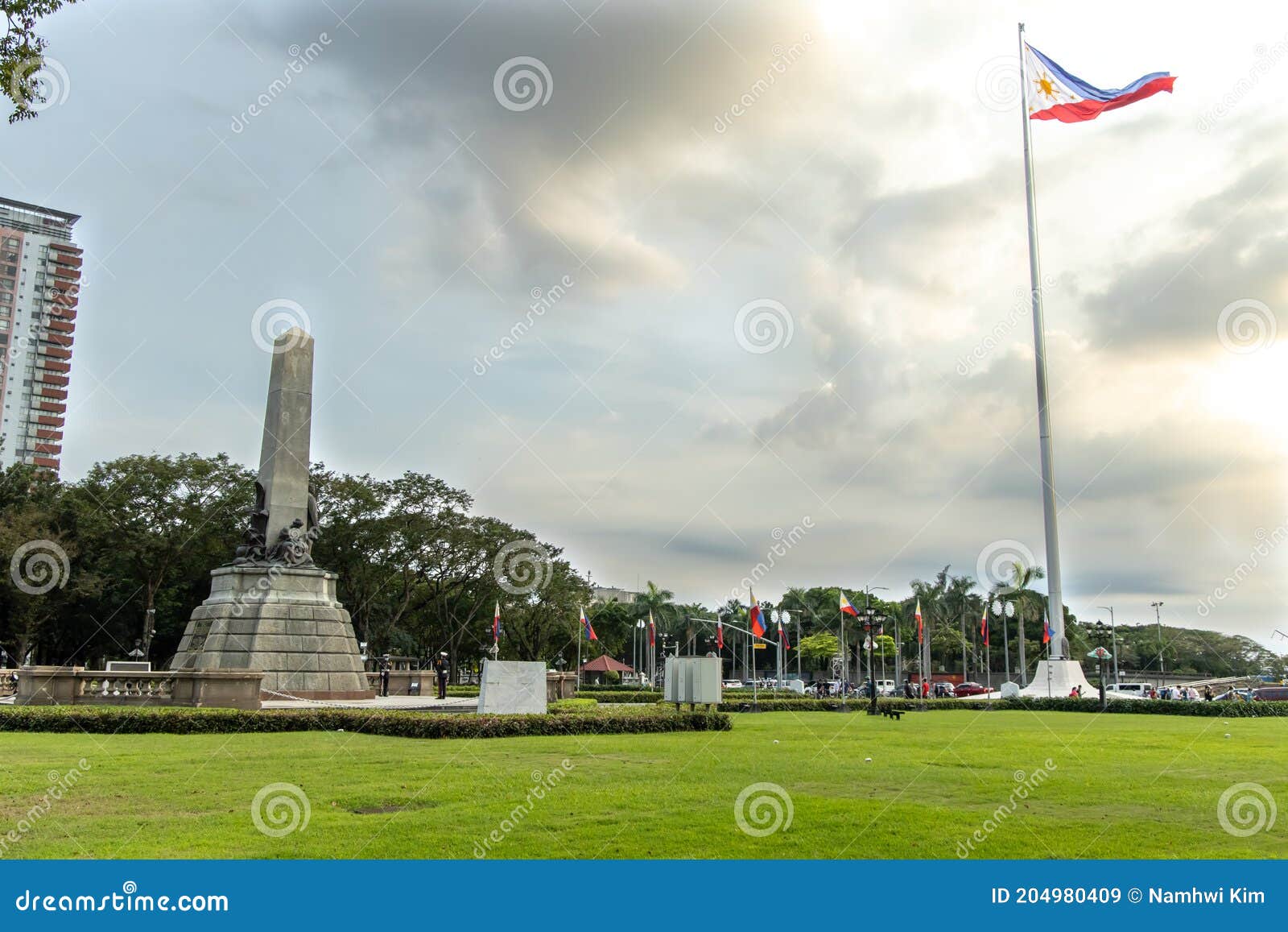 Dr. Jose Rizal National Monument and National Flags in the Wind, Manila ...