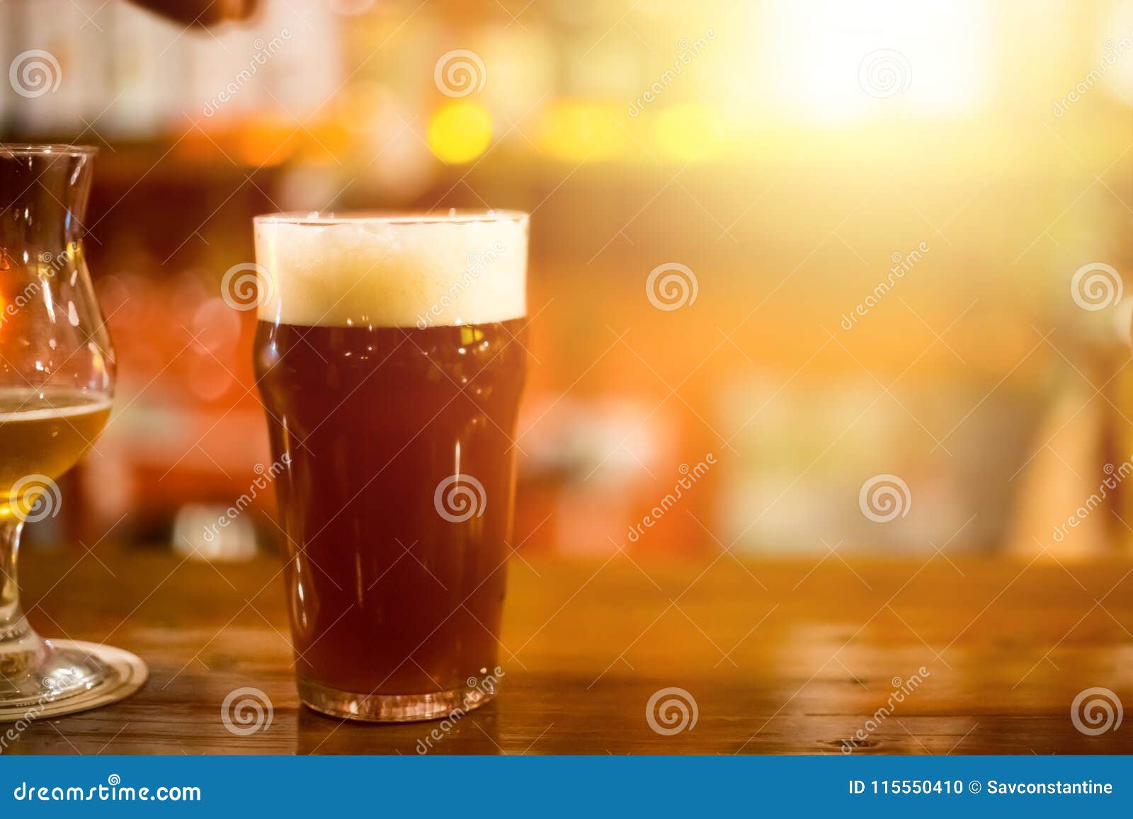 Draft beer on bar stock photo. Image of liquid, booze - 115550410