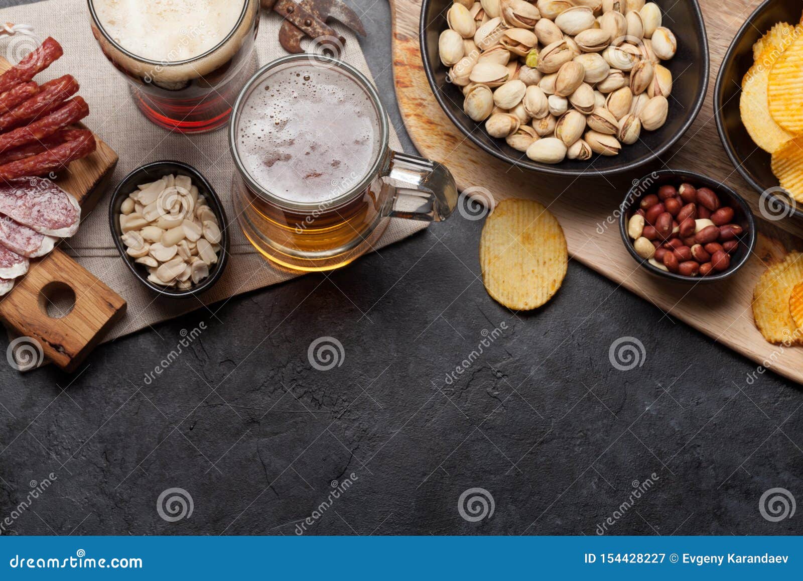Draft beer and snacks stock image. Image of food, board - 154428227