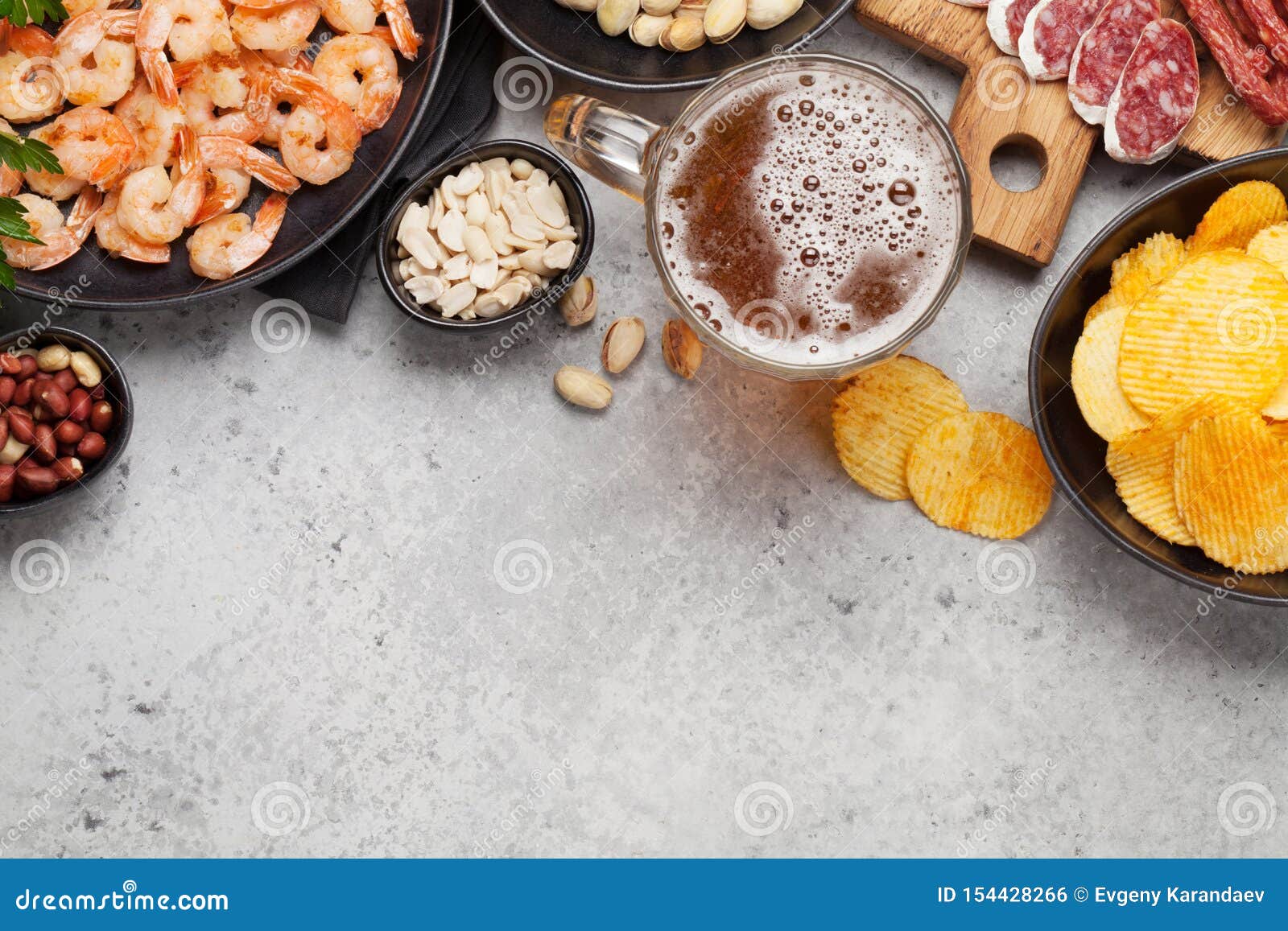Draft beer and snacks stock photo. Image of background - 154428266