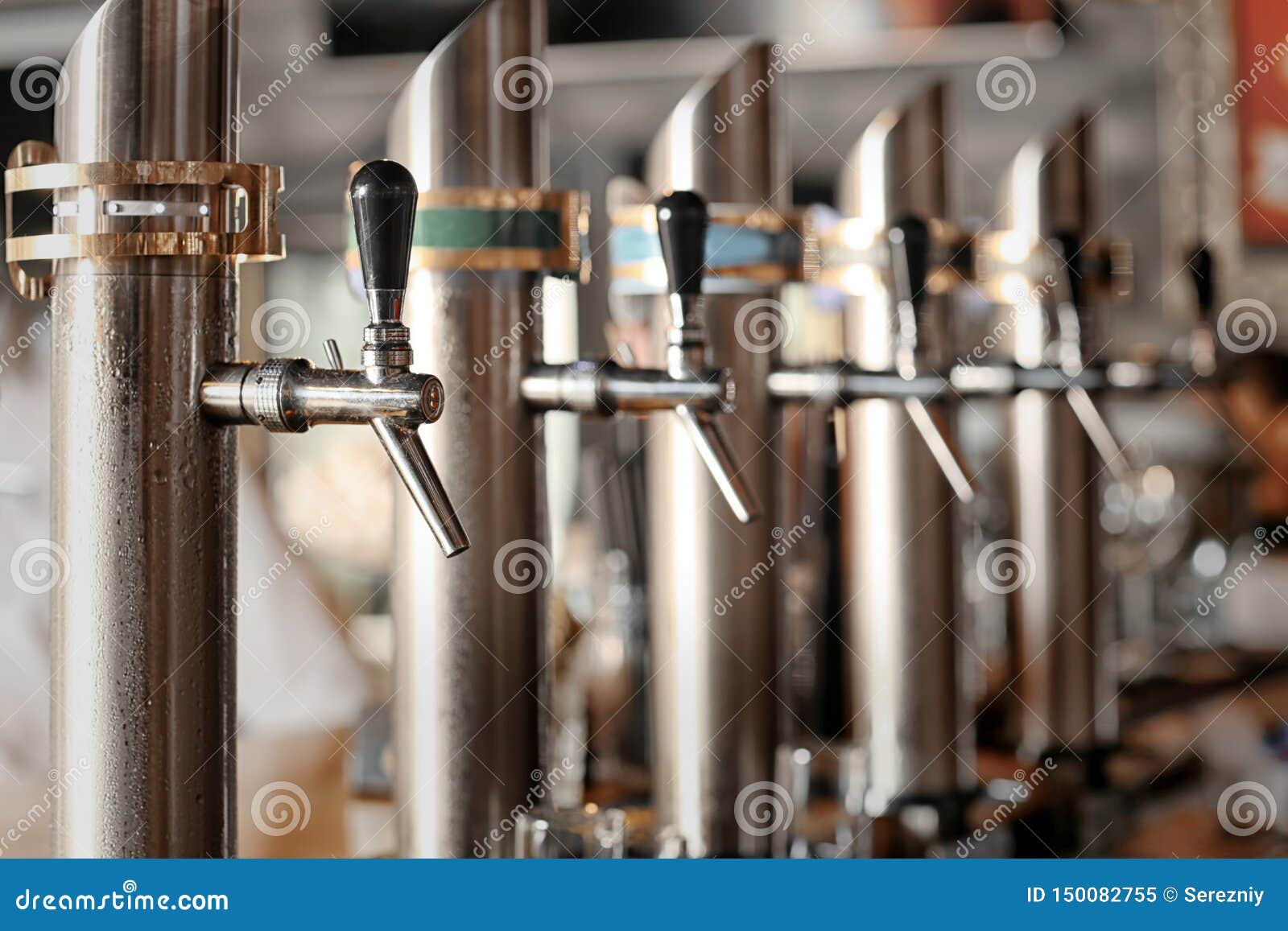 Draft Beer Taps in Modern Bar Stock Image - Image of sort, light: 150082755
