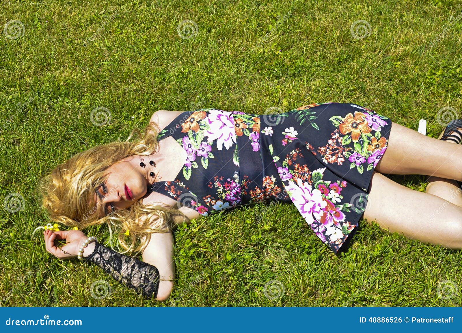 Drag queen lying on grass stock photo. Image of homosexual - 40886526