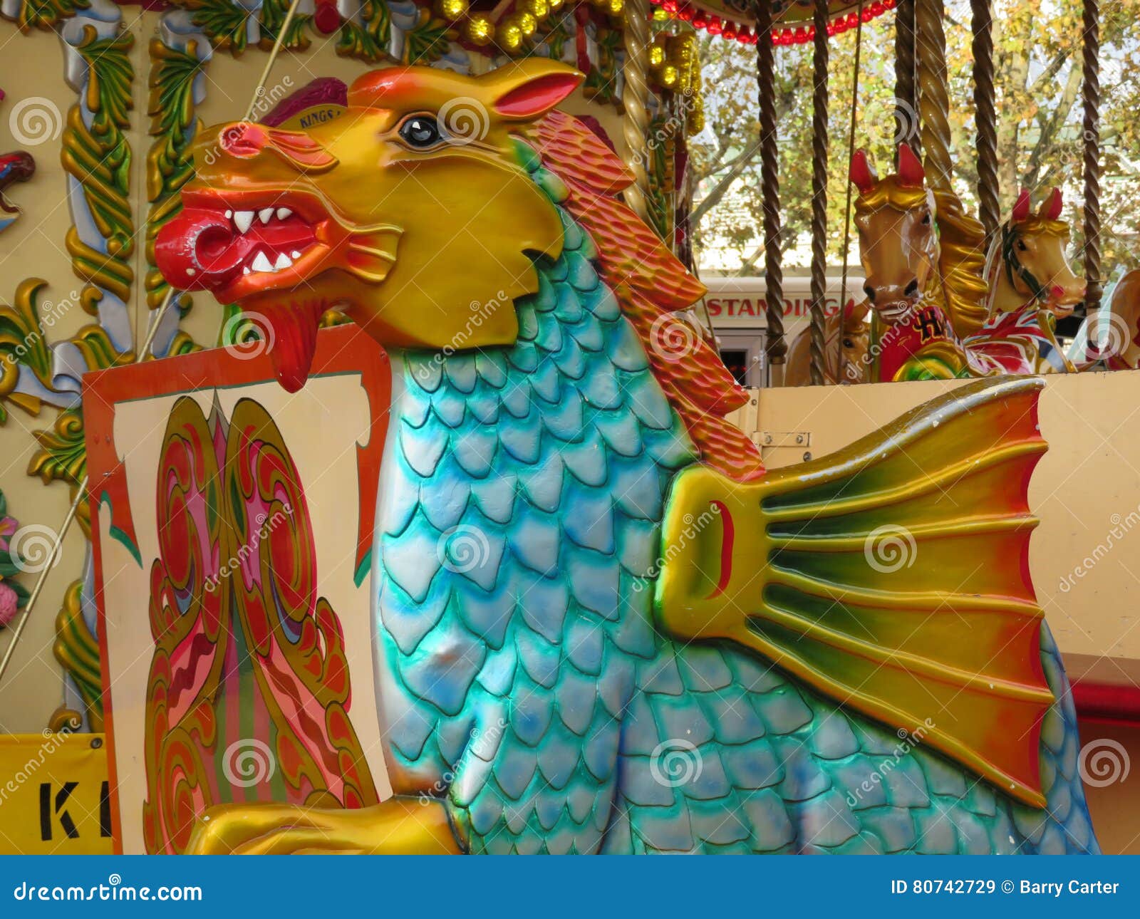 Dragon on a carousel stock image. Image of amusement - 80742729