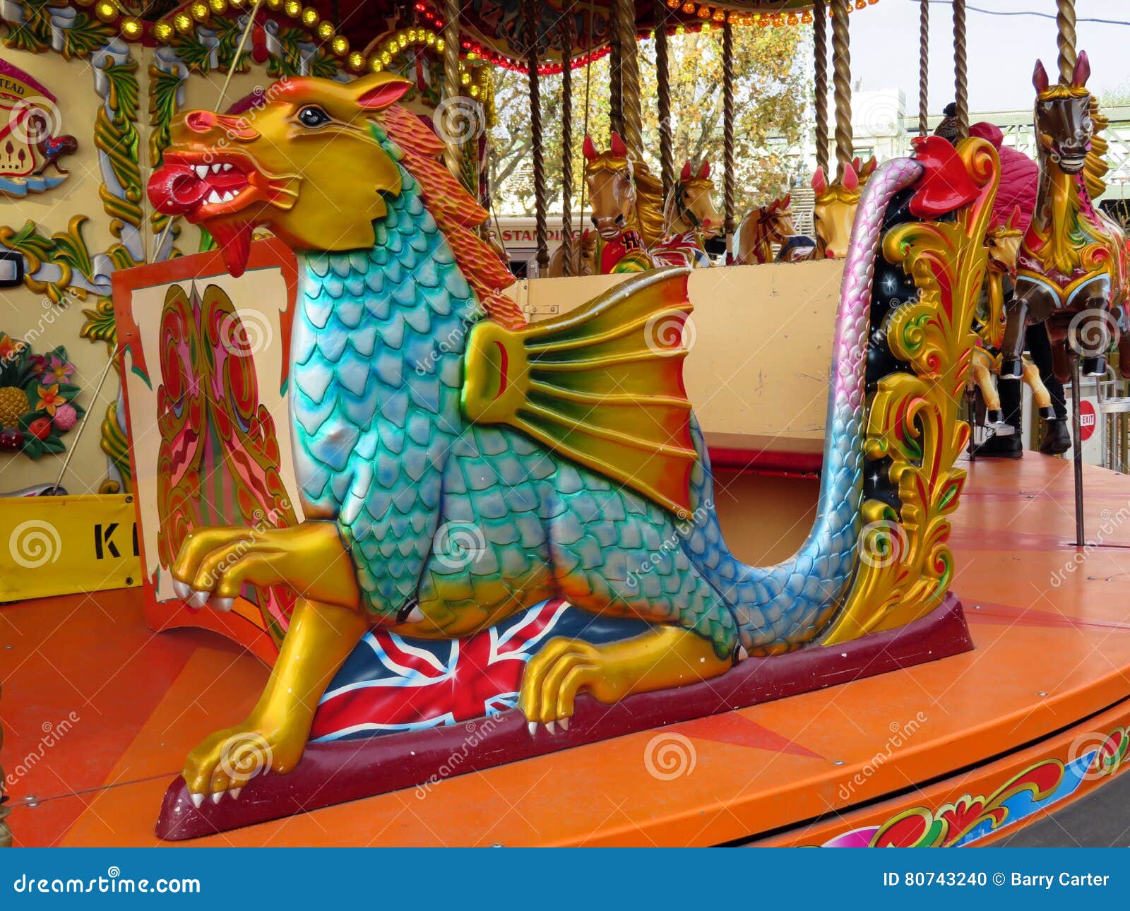 Dragon on a carousel stock photo. Image of galloping - 80743240