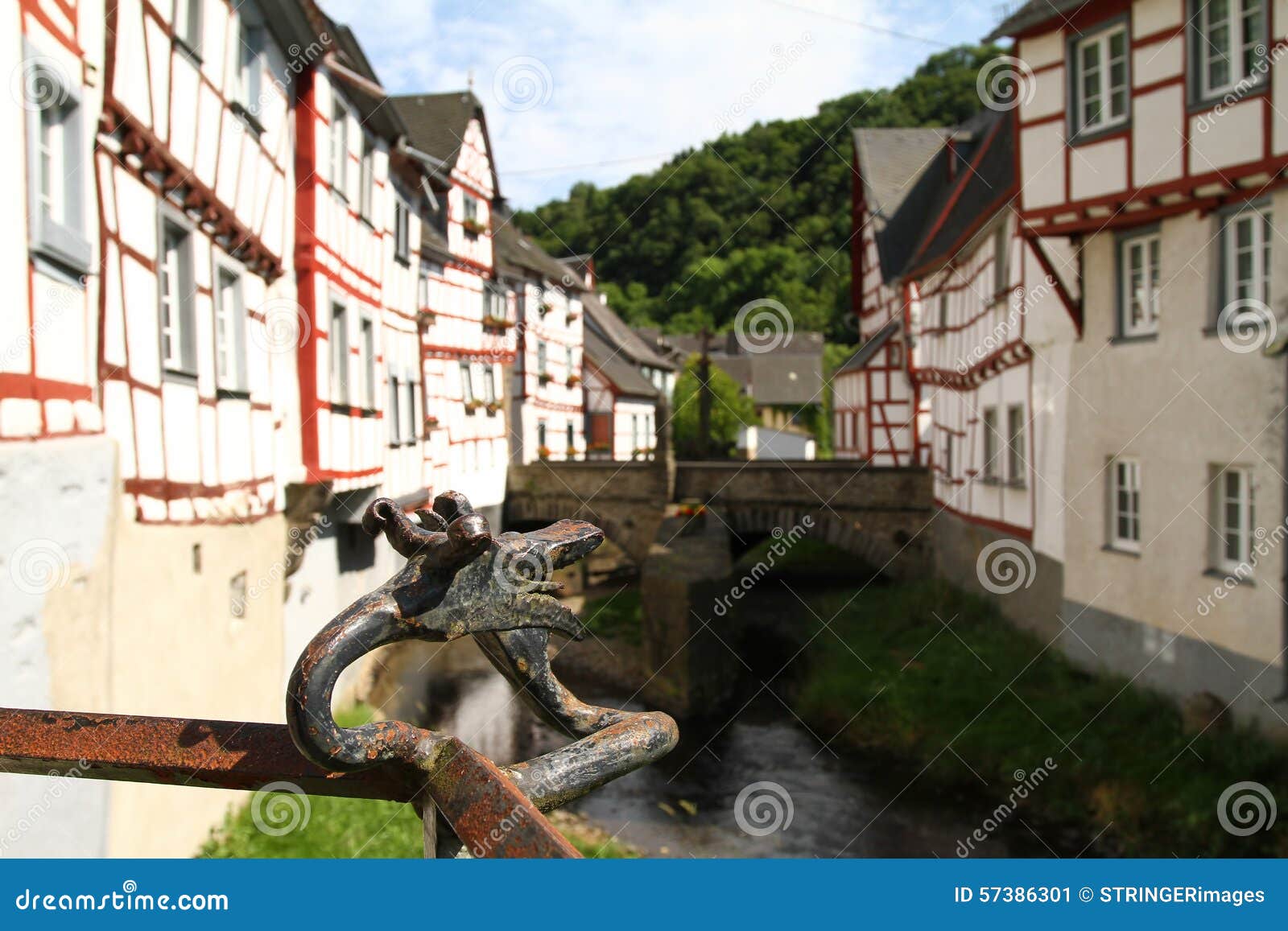 Dragon Head Railing in Front of a Medieval Village Backdrop Stock Image ...