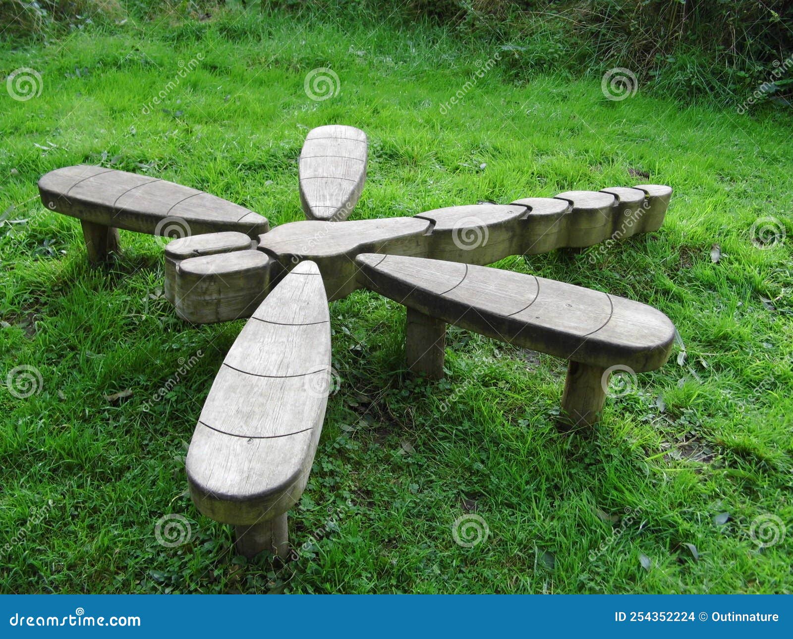 Dragonfly Shaped Carved Seating Bench Stock Photo - Image of benches ...