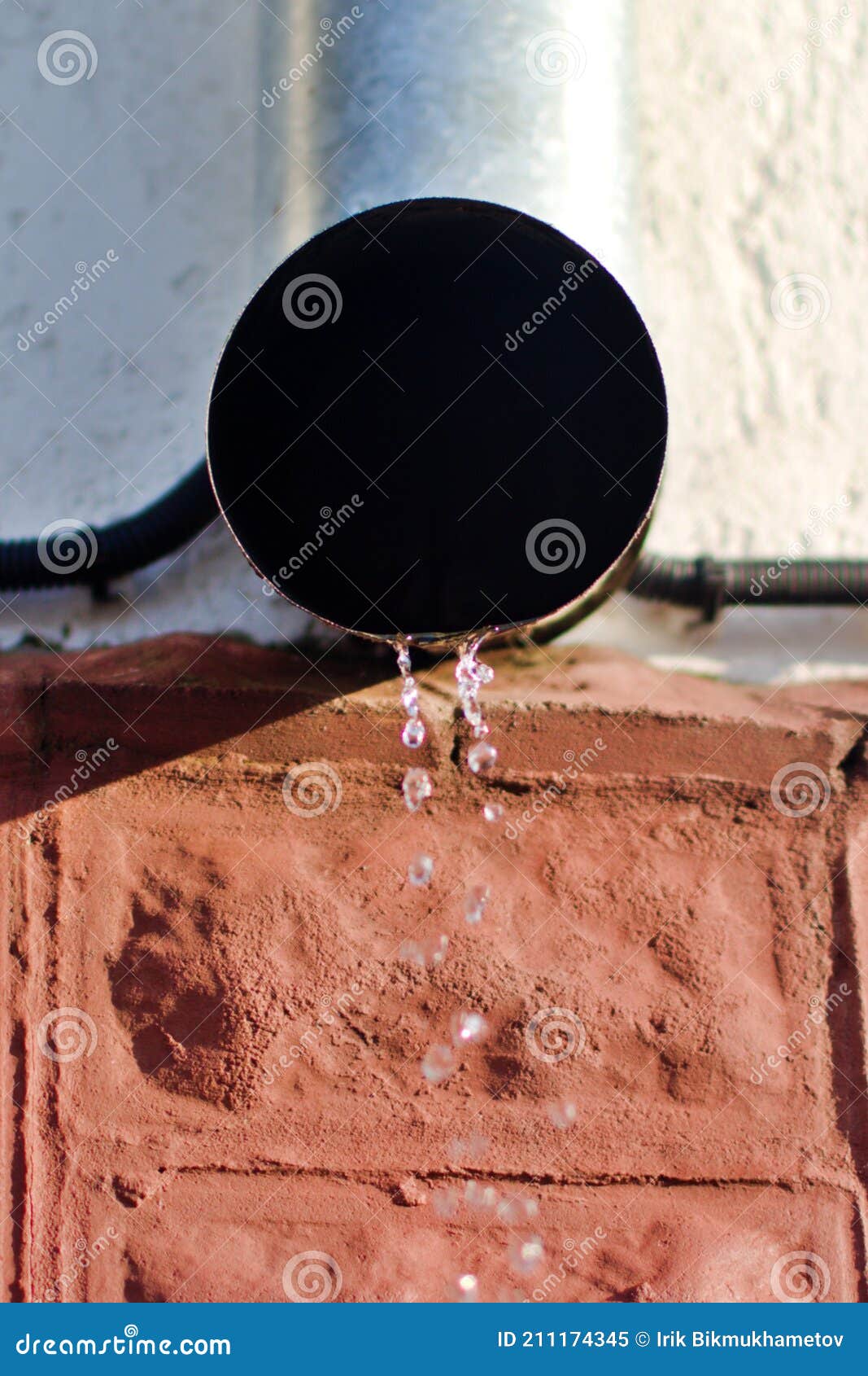 Drain Downpipe on Wall of House with Falling Drops Stock Image - Image ...