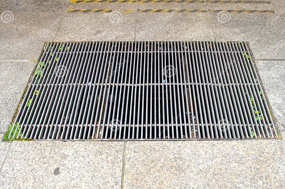 Drain or Gutter with Grate in Germany Closeup Stock Photo - Image of ...