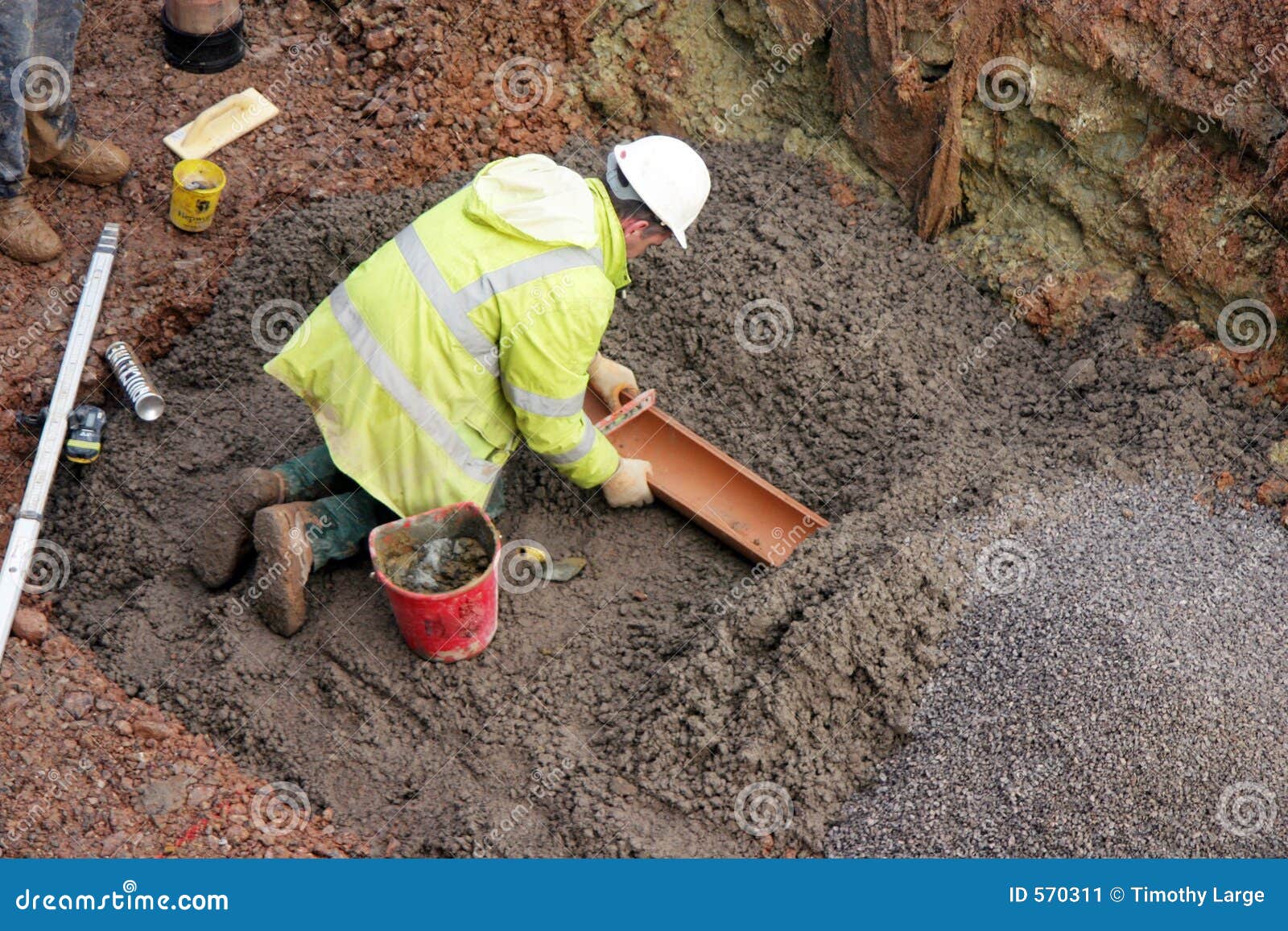 Drain laying stock image. Image of pipe, concretehardhat - 570311