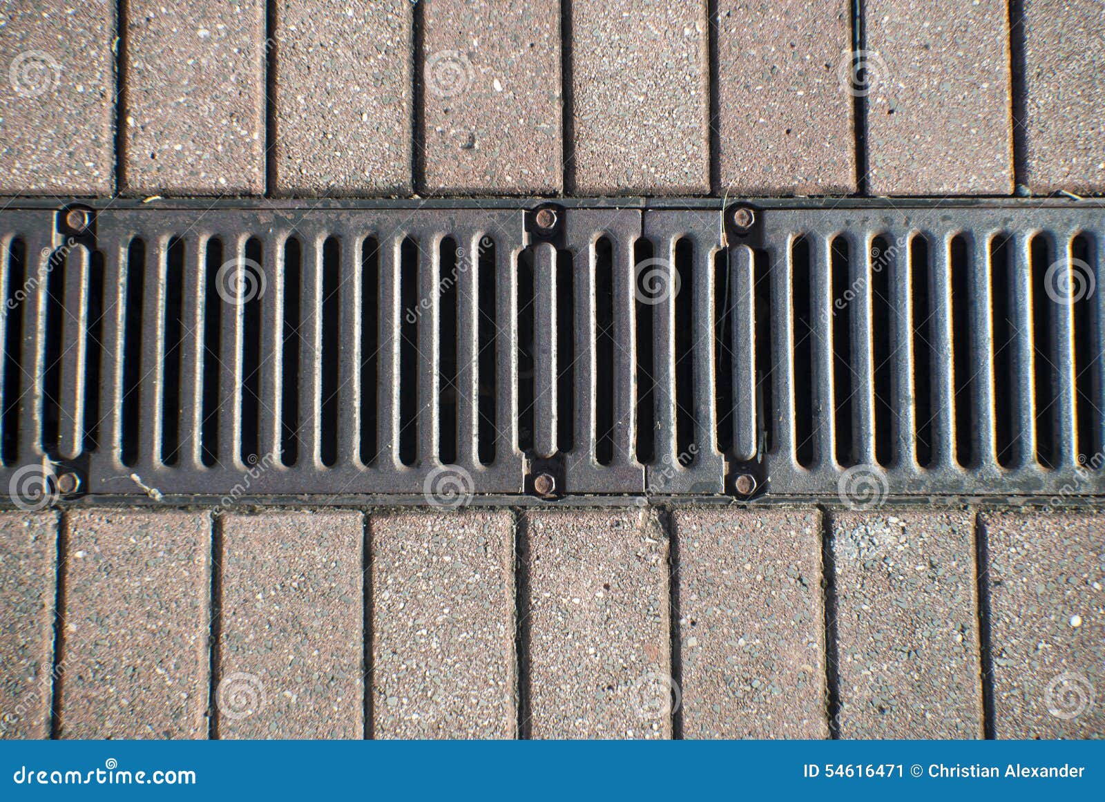 Drain in the Middle of a Paved Footpath Stock Image - Image of grate ...