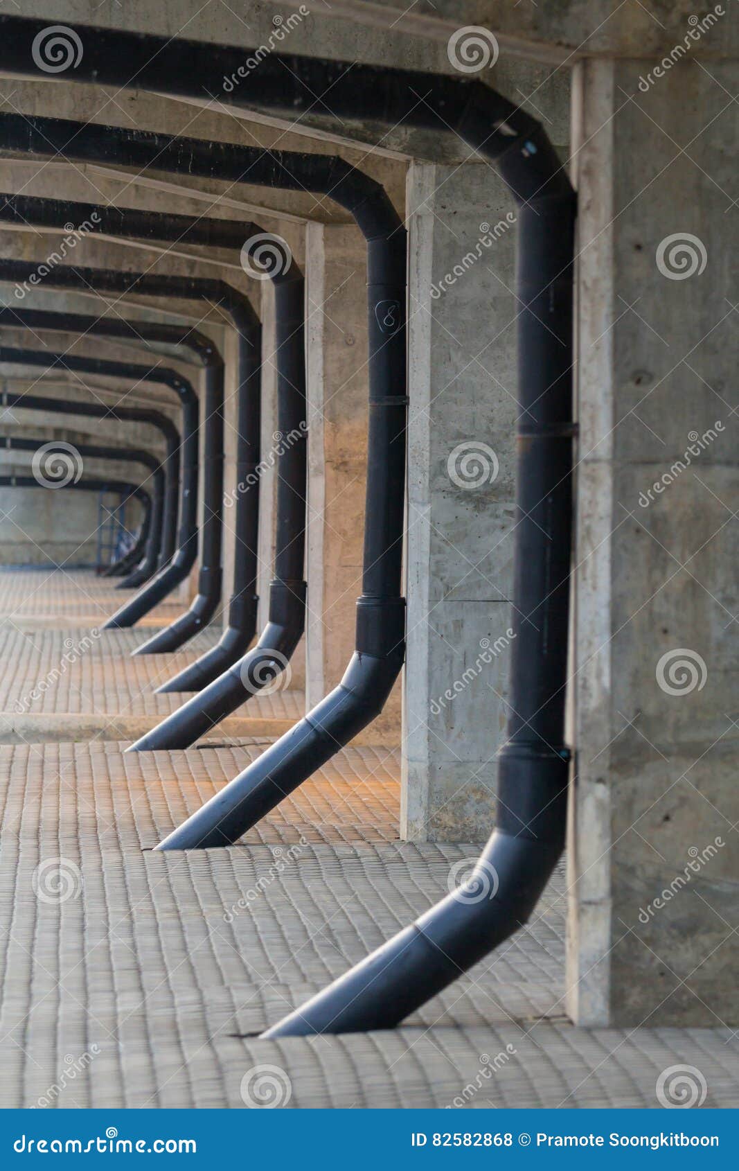 Drain pipe under of bridge stock photo. Image of sewer - 82582868