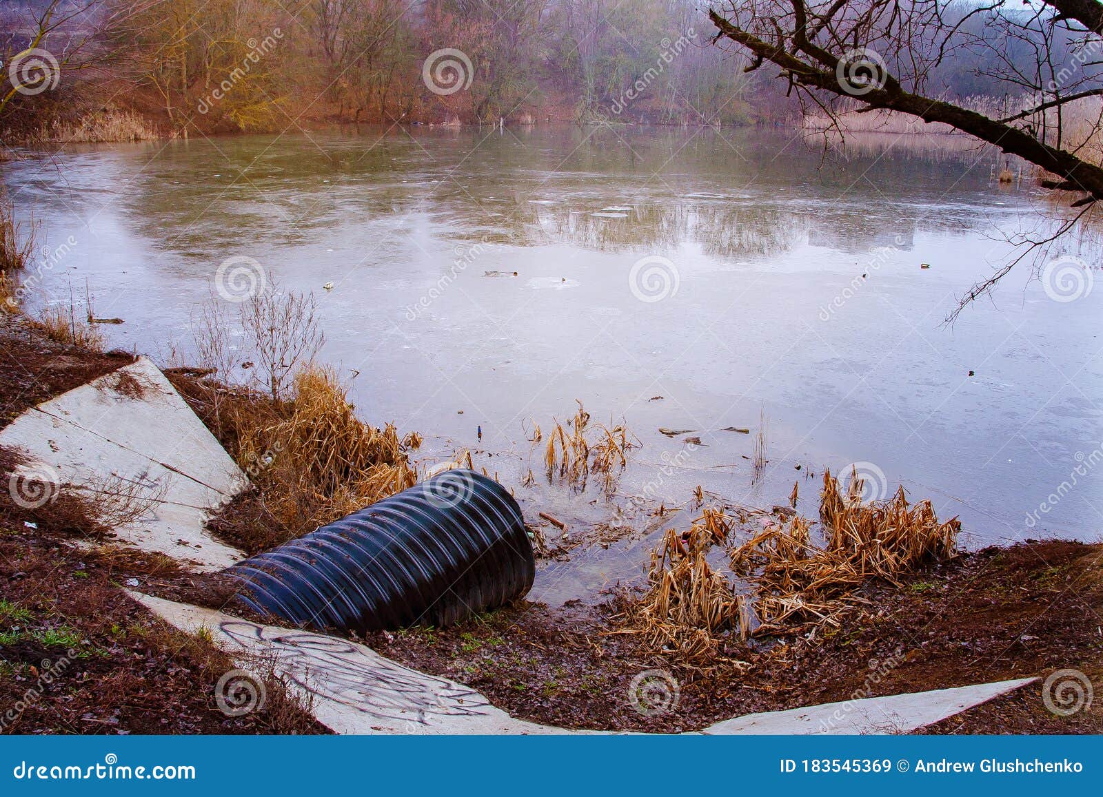 The Drainage Pipe Goes into the Lake. Sewer To the River Stock Image ...