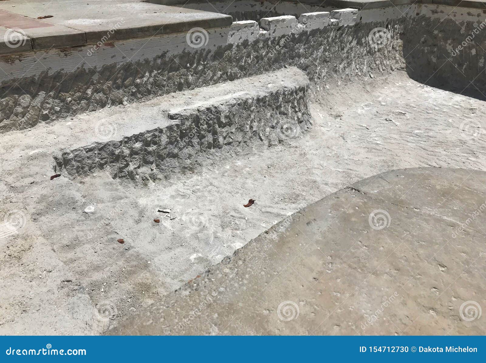 A Drained and Demolished Pool Stock Photo - Image of surface, plaster ...