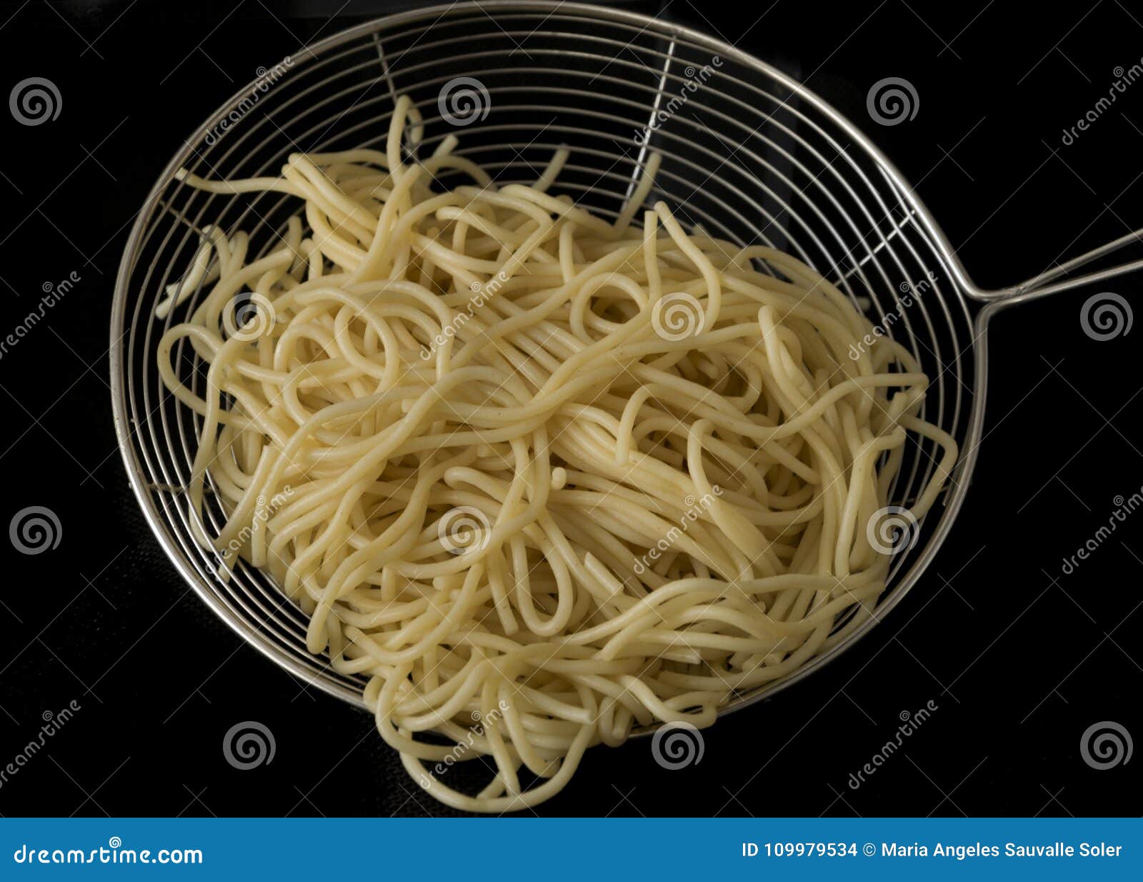 Draining spaghetti. stock photo. Image of drain, popular - 109979534