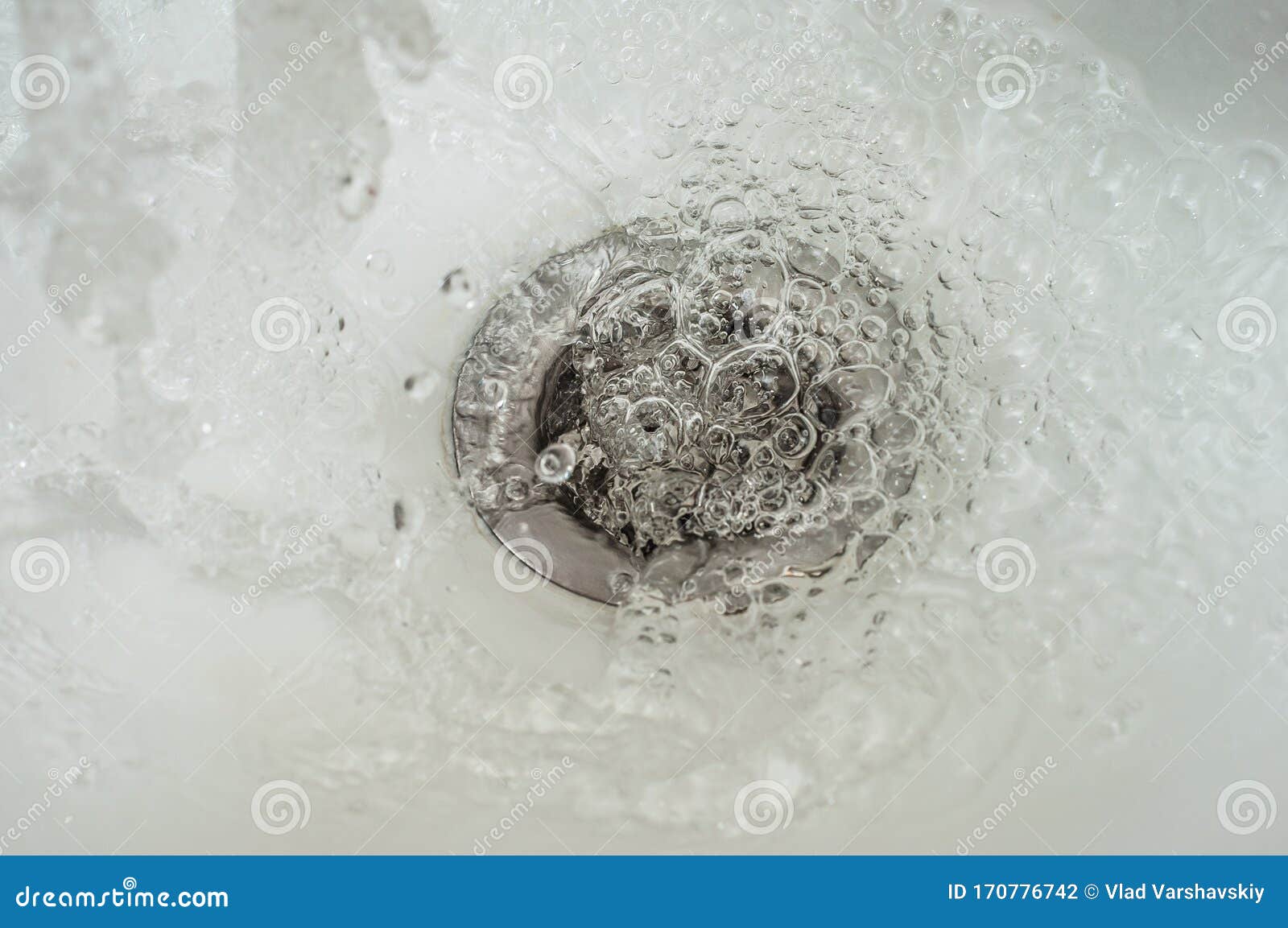 Draining Transparent Water into the Bathroom Drain Stock Photo - Image ...